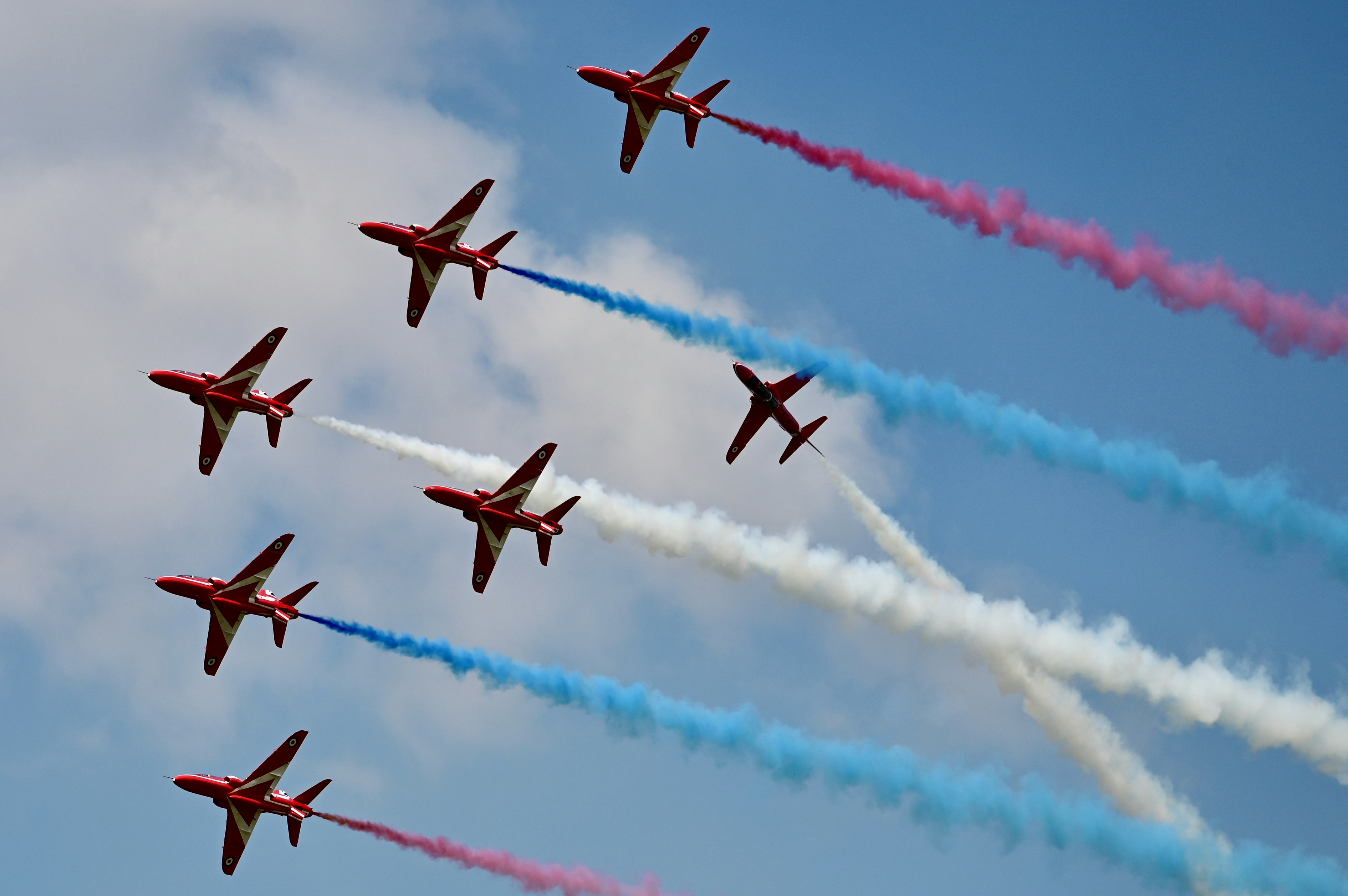 A group of jets flying through a blue sky photo – Free Red arrows Image ...
