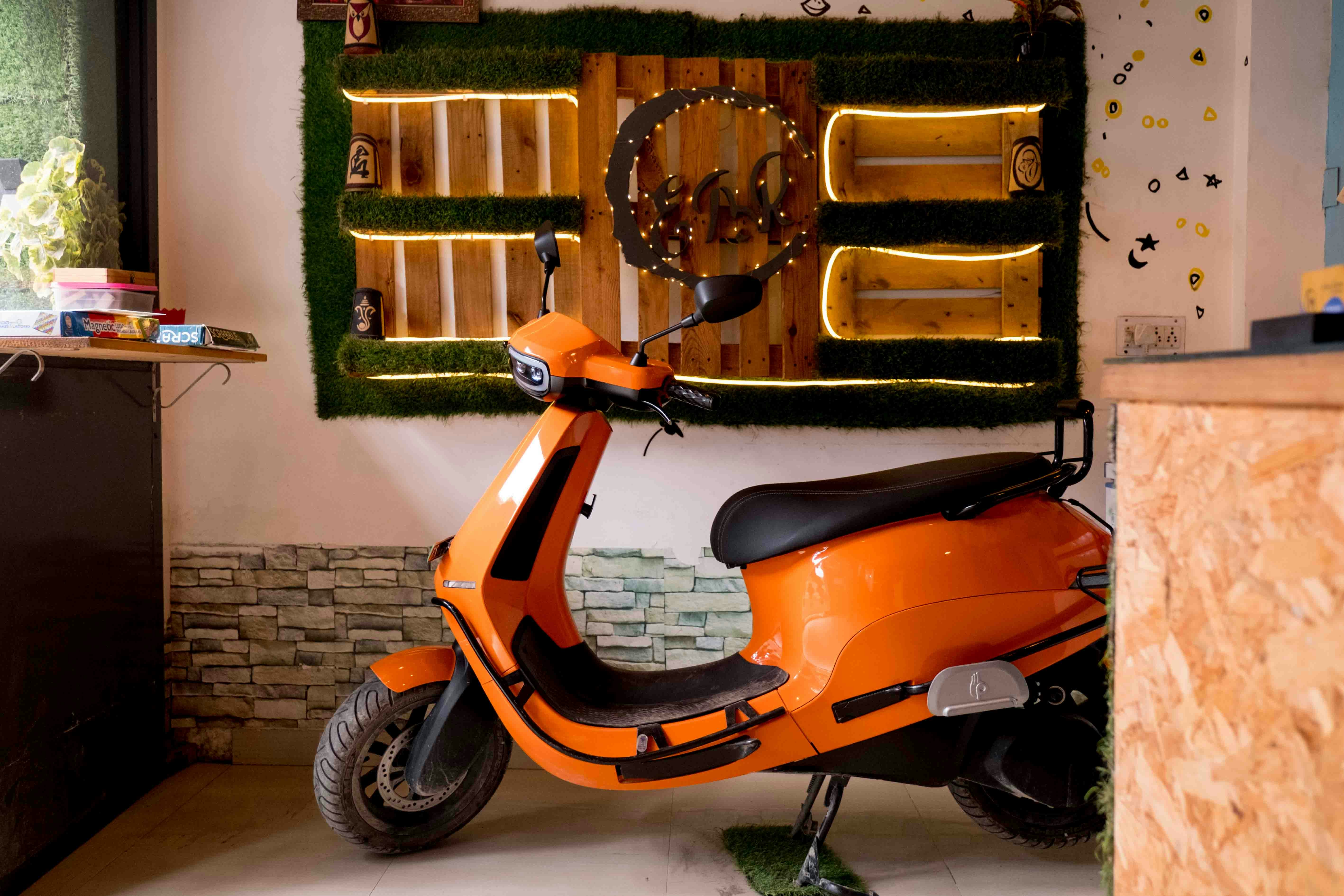 Crimson Cruiser in a Neon-Accented Indoor Nook