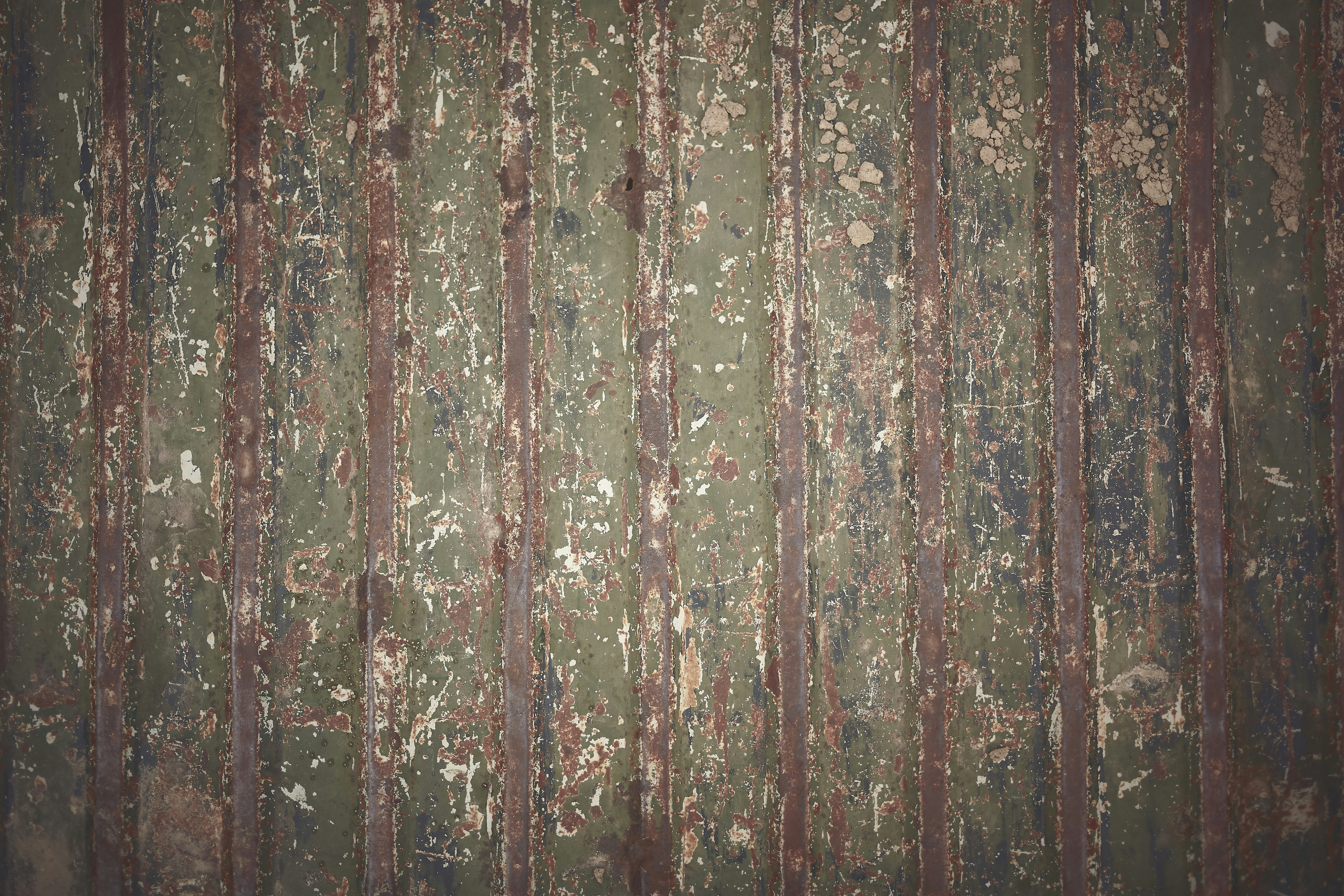 Weathered Planks: Stripes of Time in Green-Red Grain