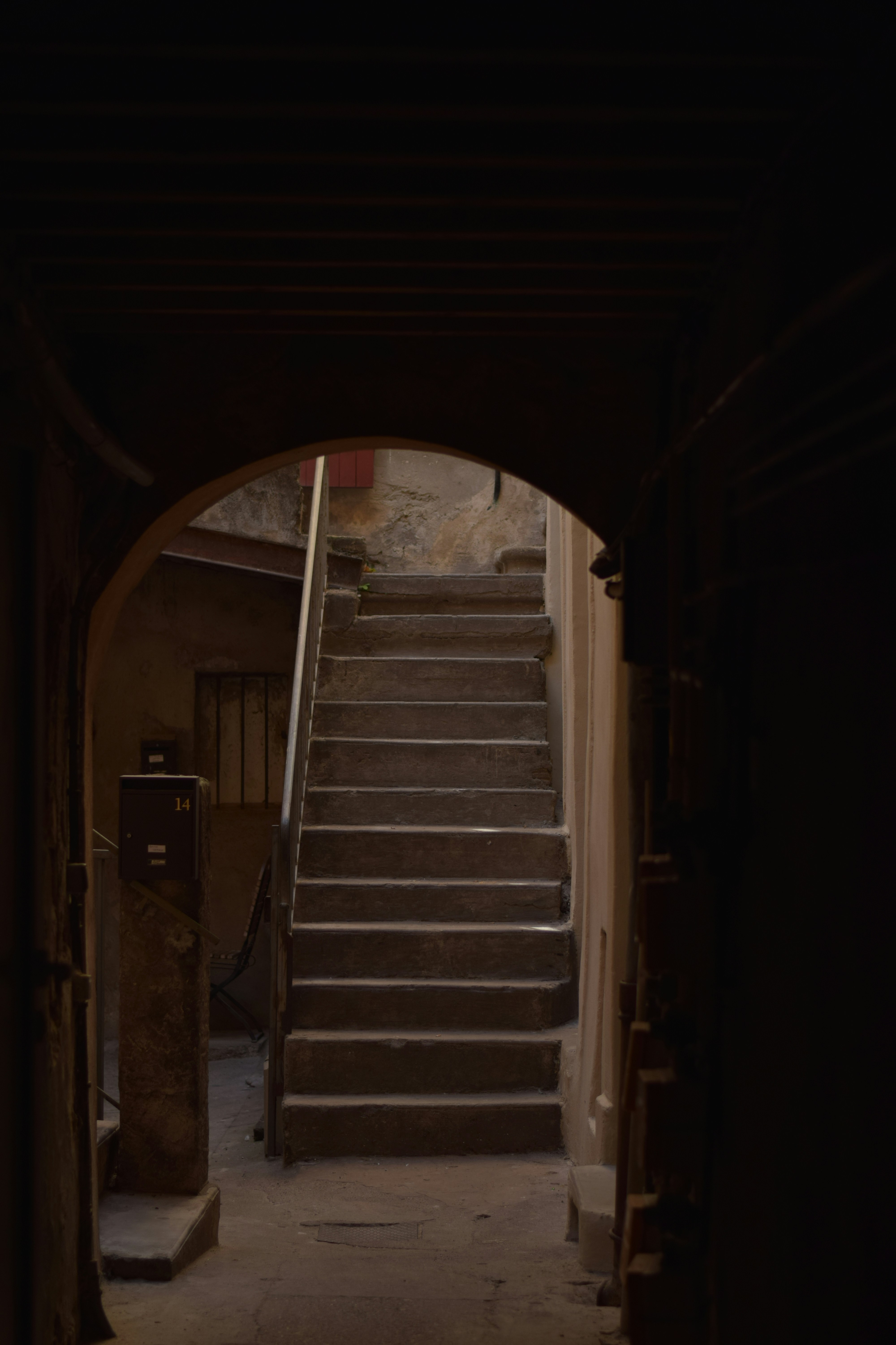 A set of stairs leading up to a phone booth photo – Free Uzès Image on ...