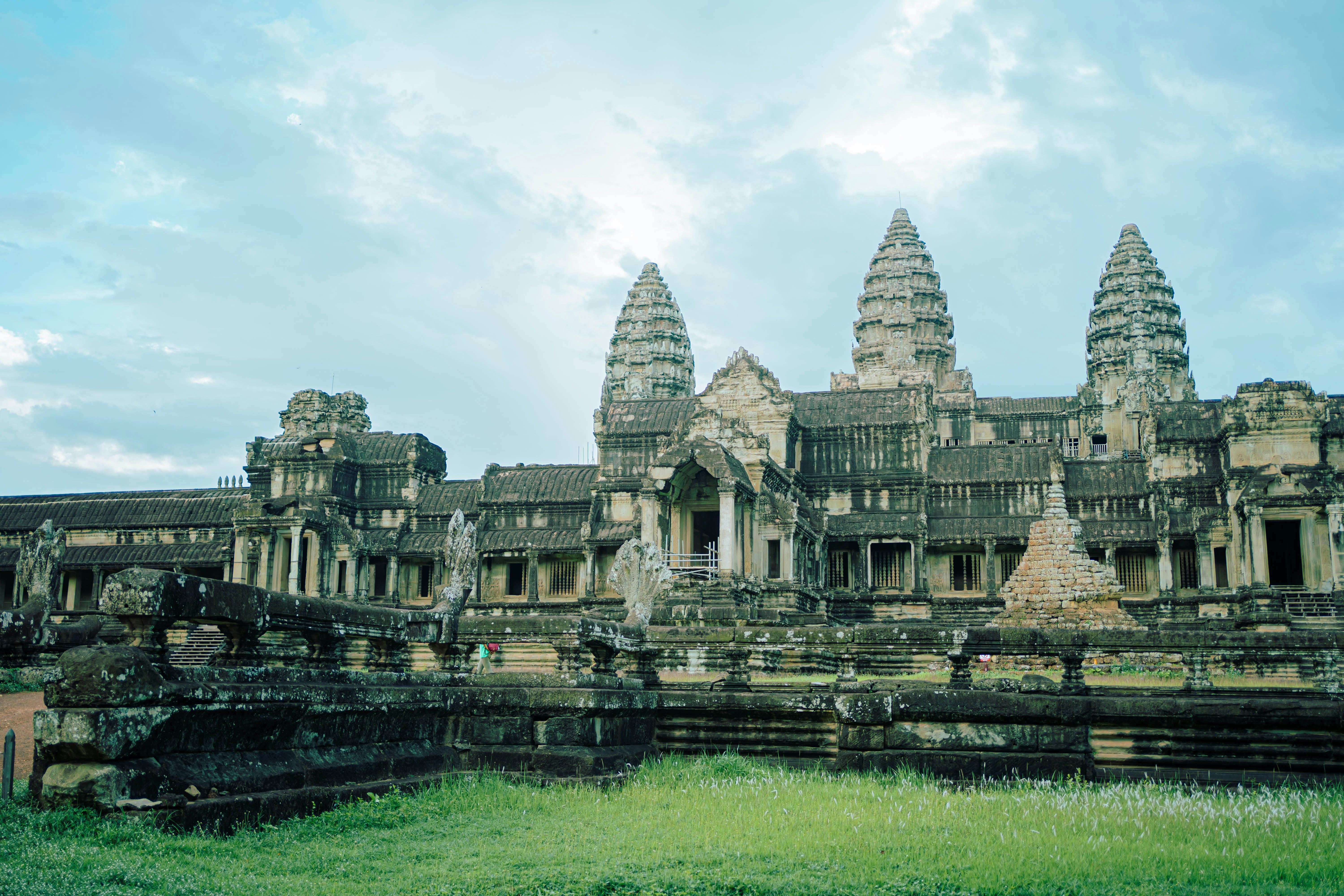 A large stone building with many towers on top of it photo – Free ...