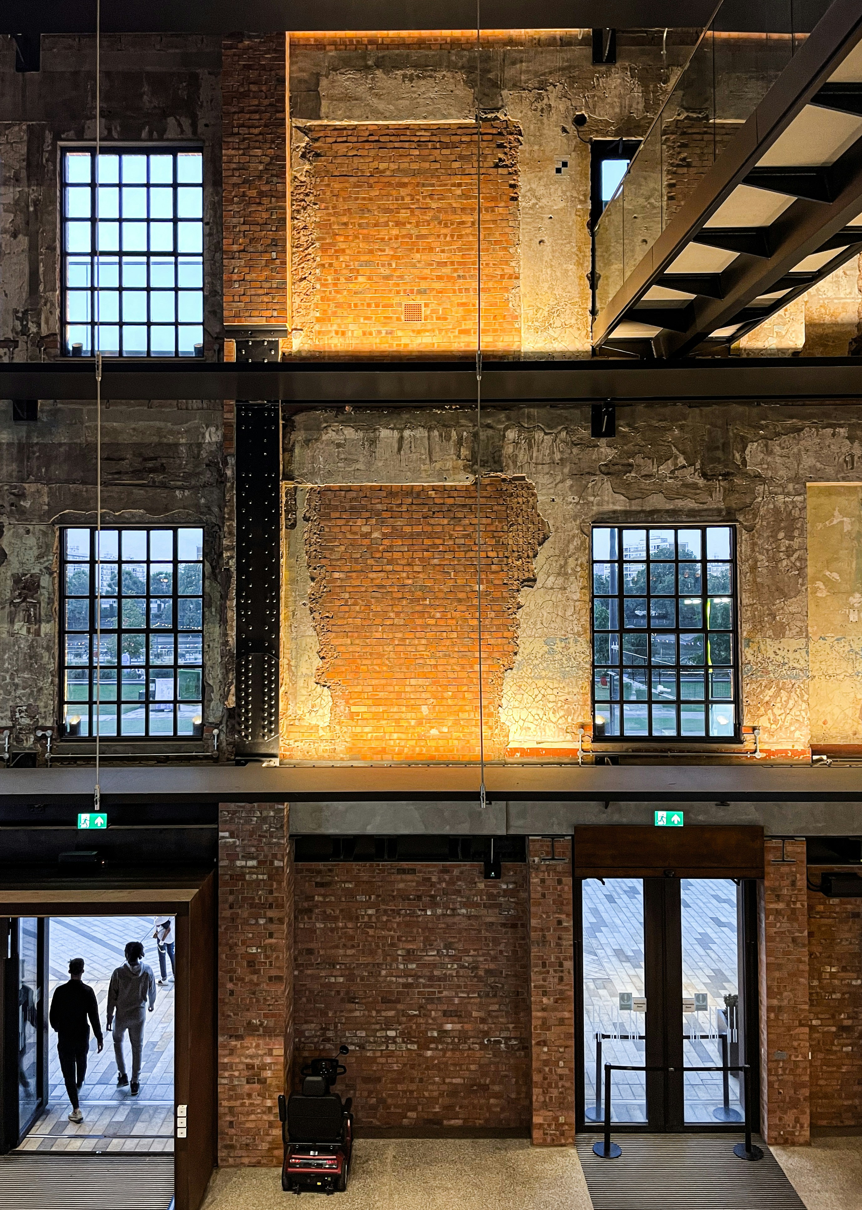 a couple of people that are walking in a buildingBernd 📷 Dittrich