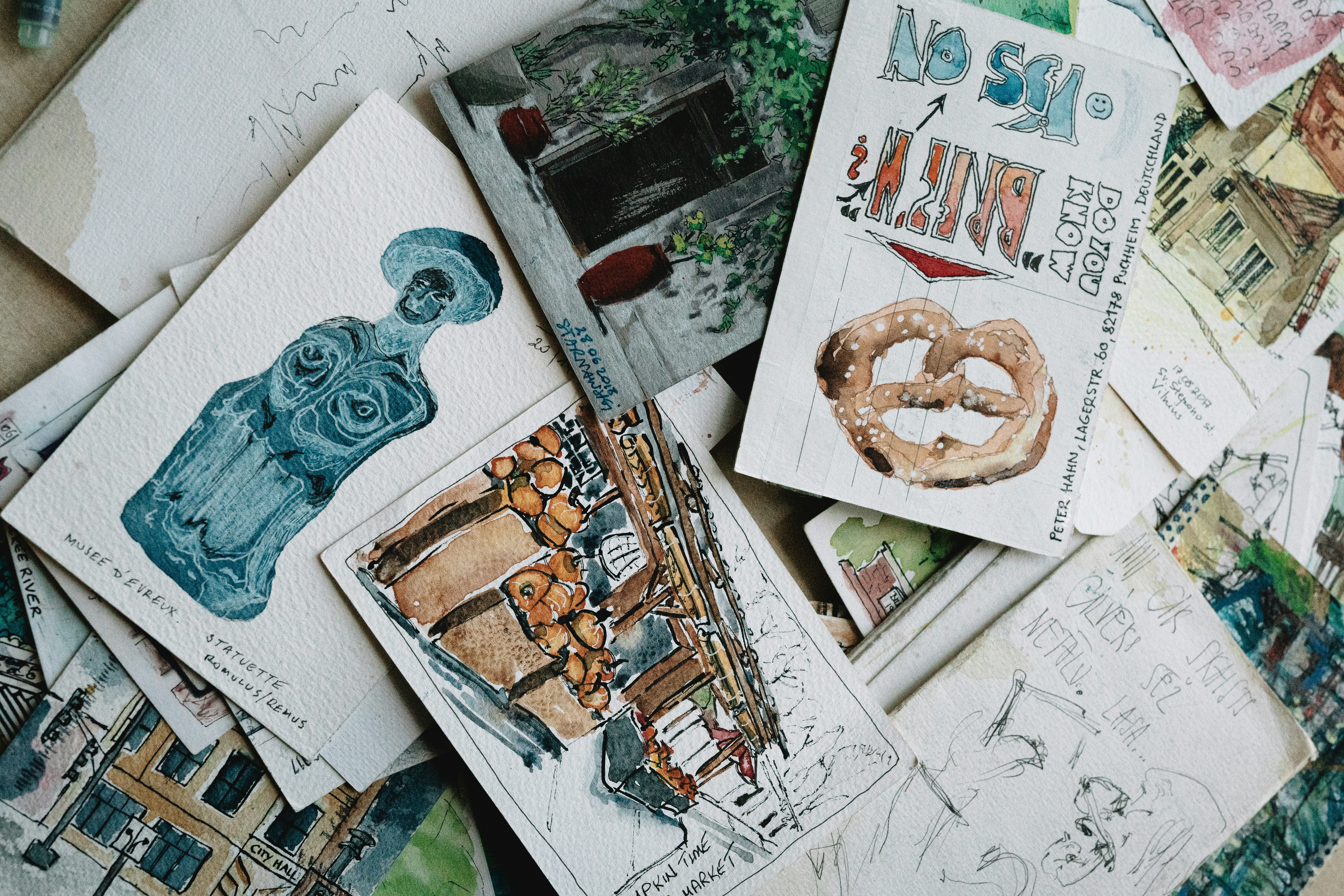 A pile of assorted cards with drawings on them photo – Free Valmiera ...