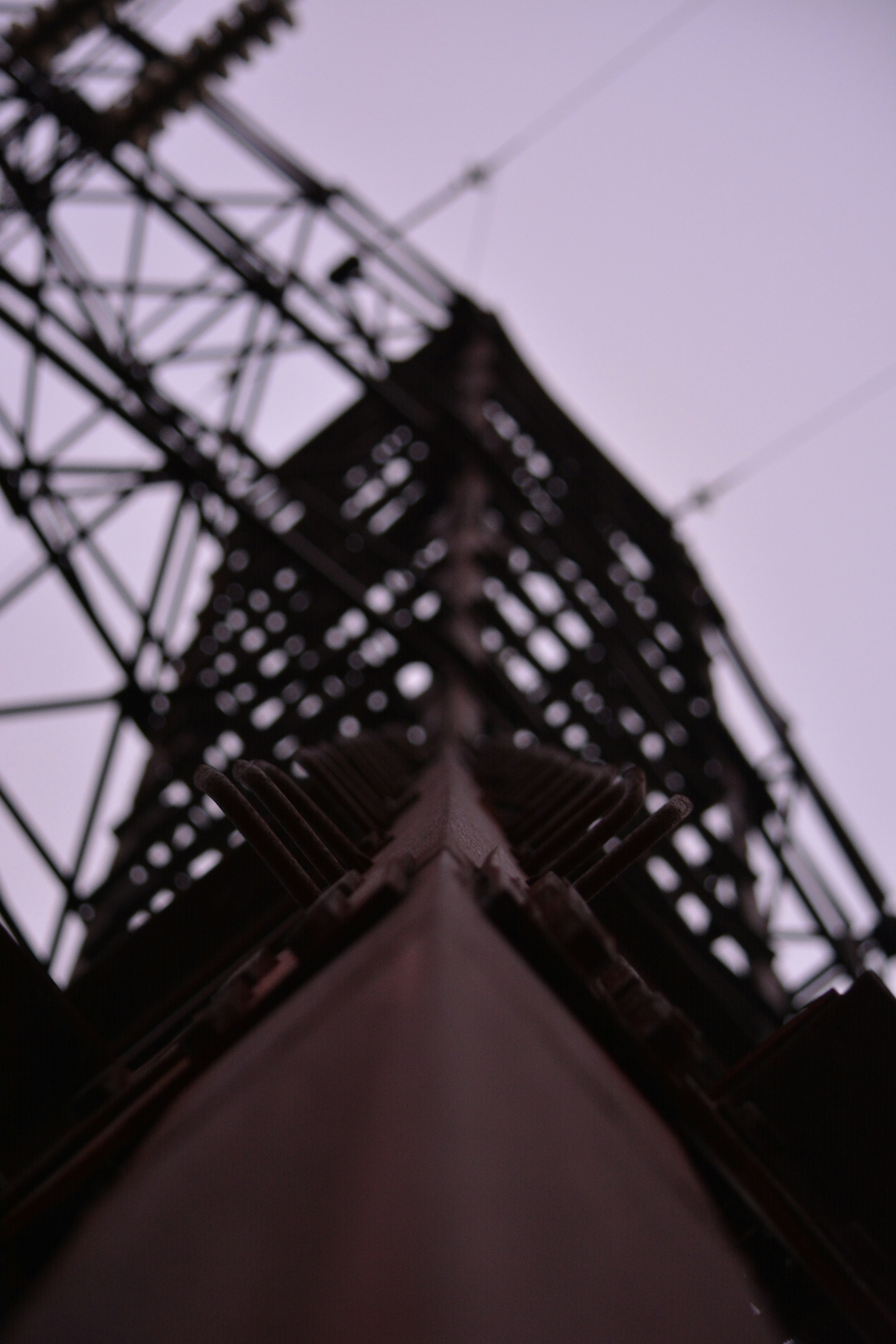 Bottom-Up Dusk: The Silent Architecture of a Transmission Tower