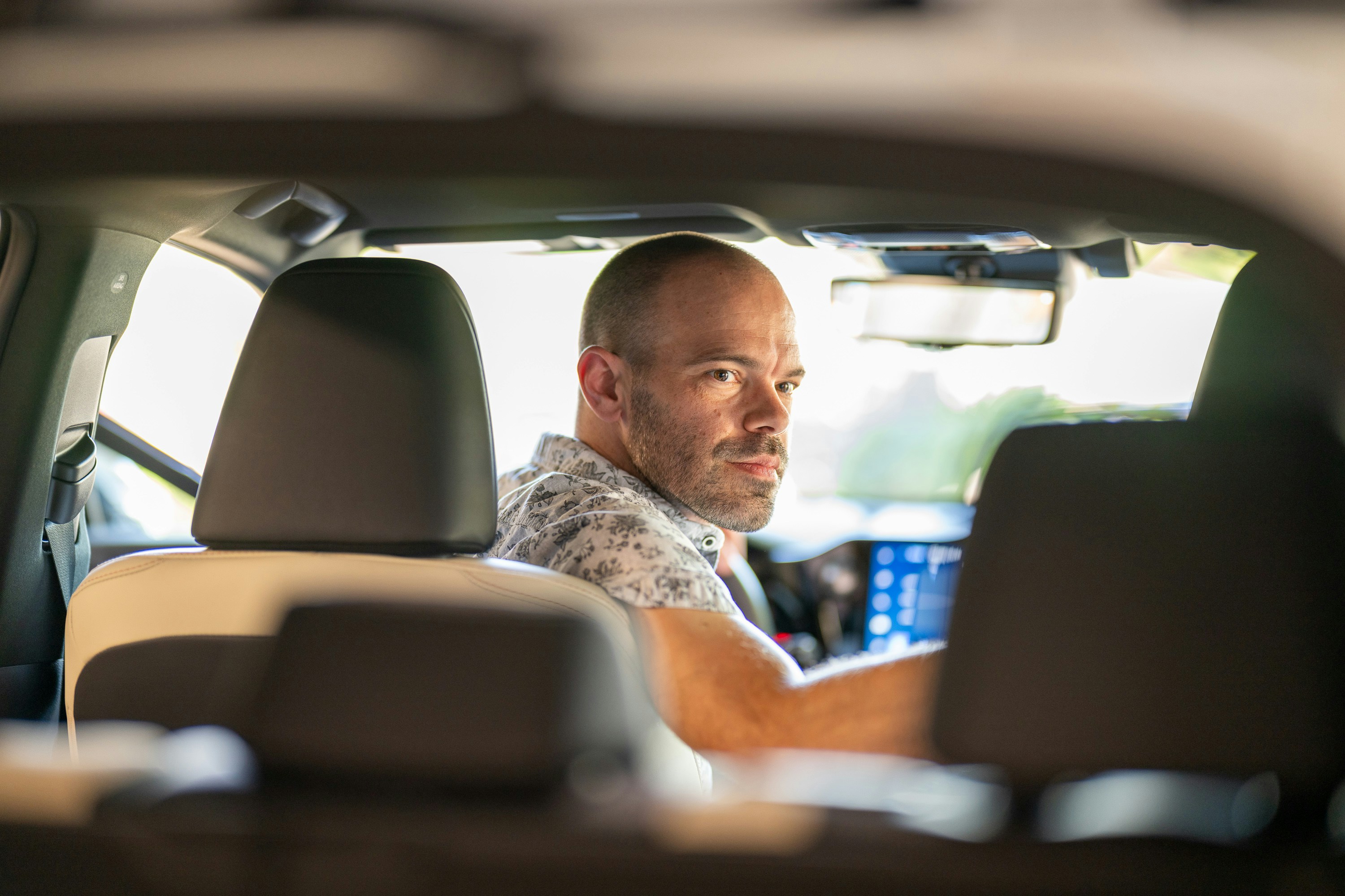 Rear-Seat Gaze: A Focused Portrait in Car Cabin