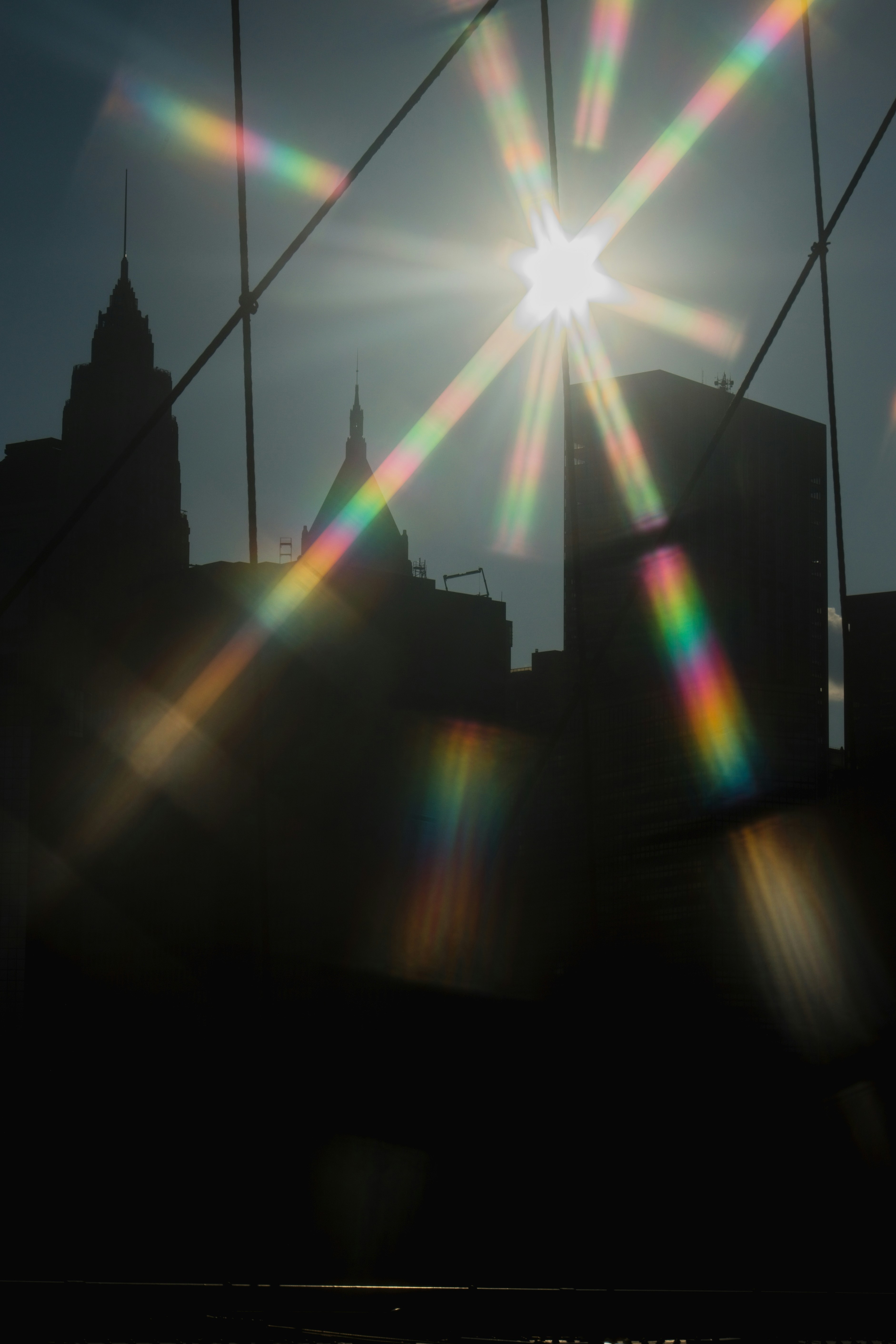 Sunburst Through Glass: Prism of a Distant Skyline