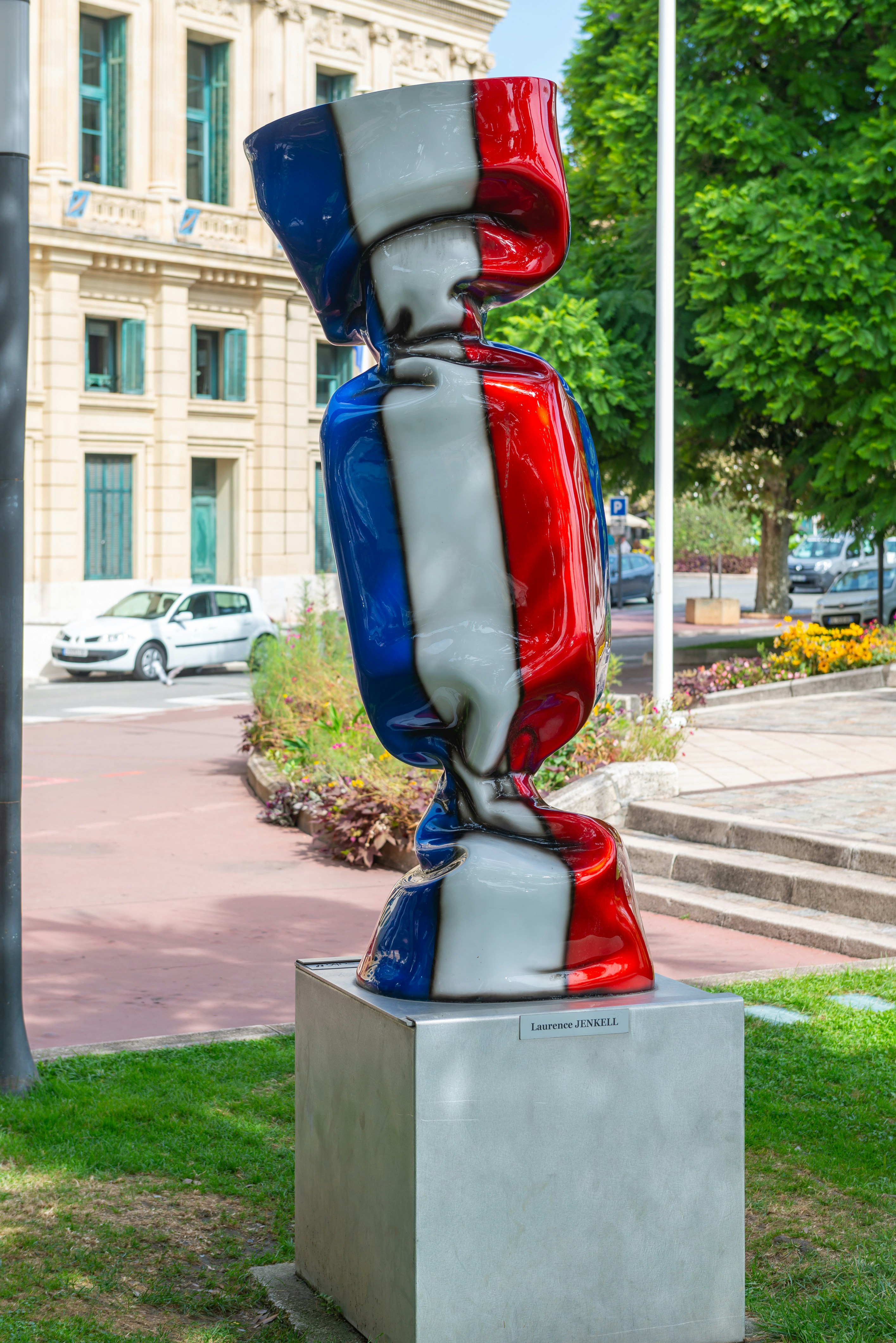 Sculpted Prism: A Tricolor Twist Stands Tall in the City