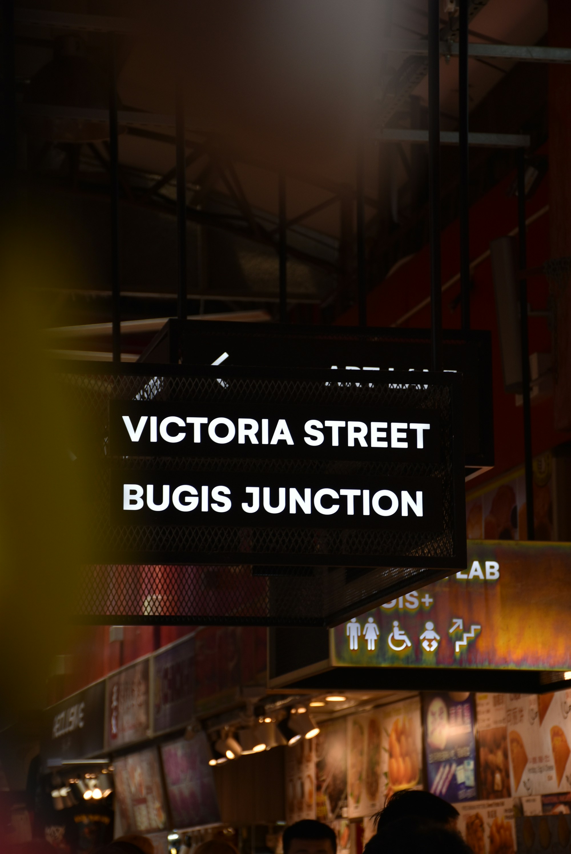 A sign that says victoria street bugis junction photo – Free Singapore ...