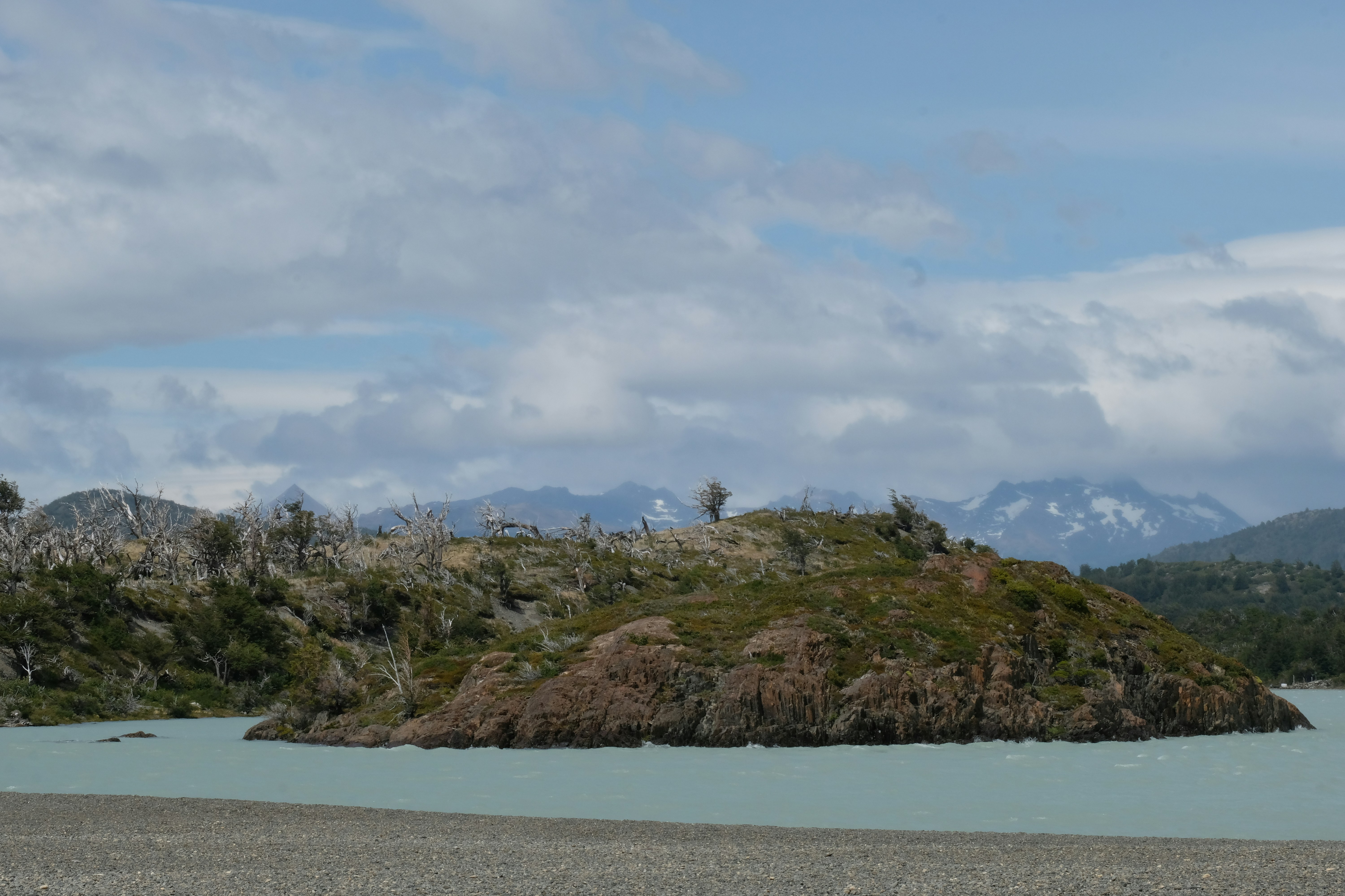 Lone Granite Isle Adrift on Turquoise Water
