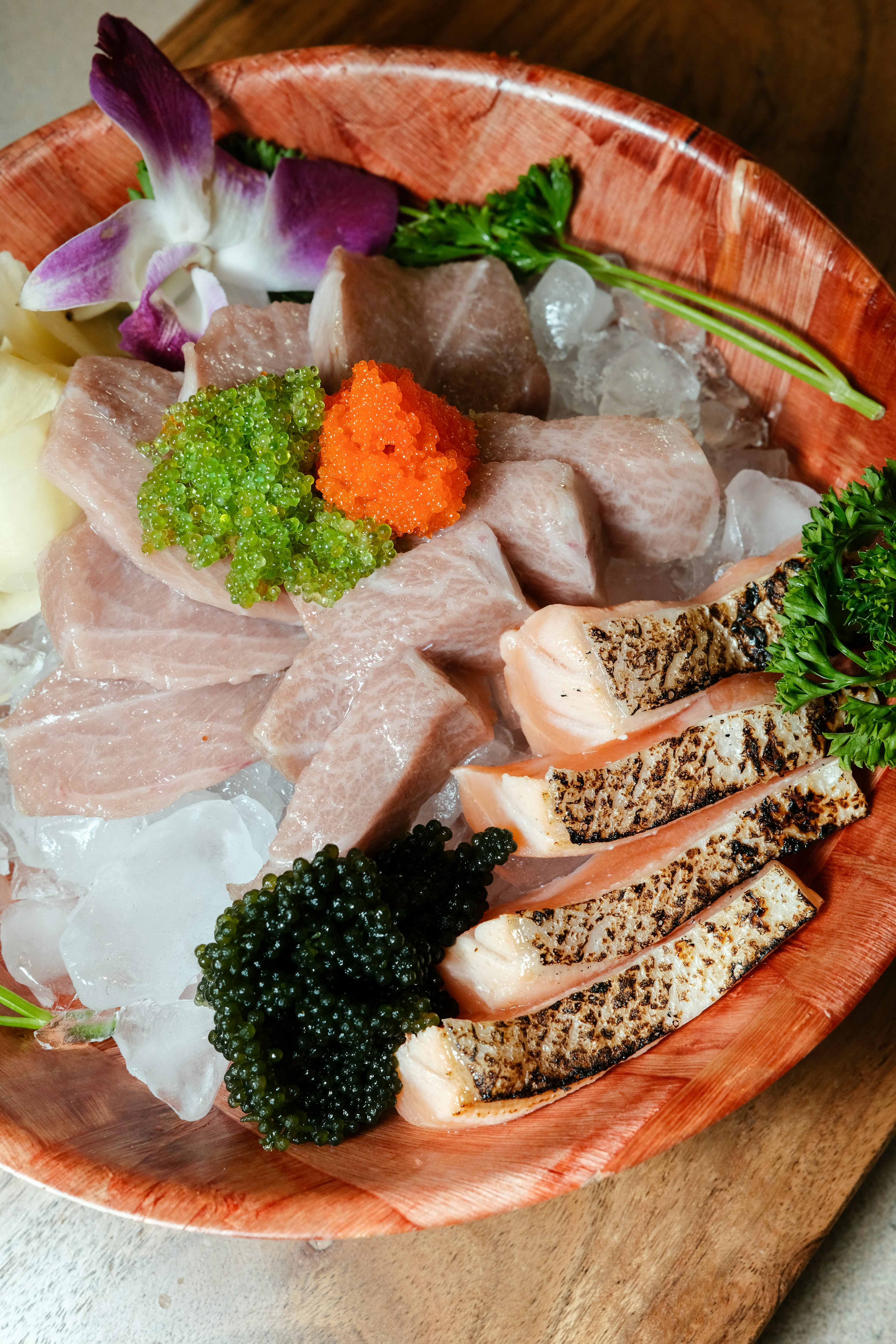 Sashimi Mosaic: Colored Caviar on a Seasonal Plate