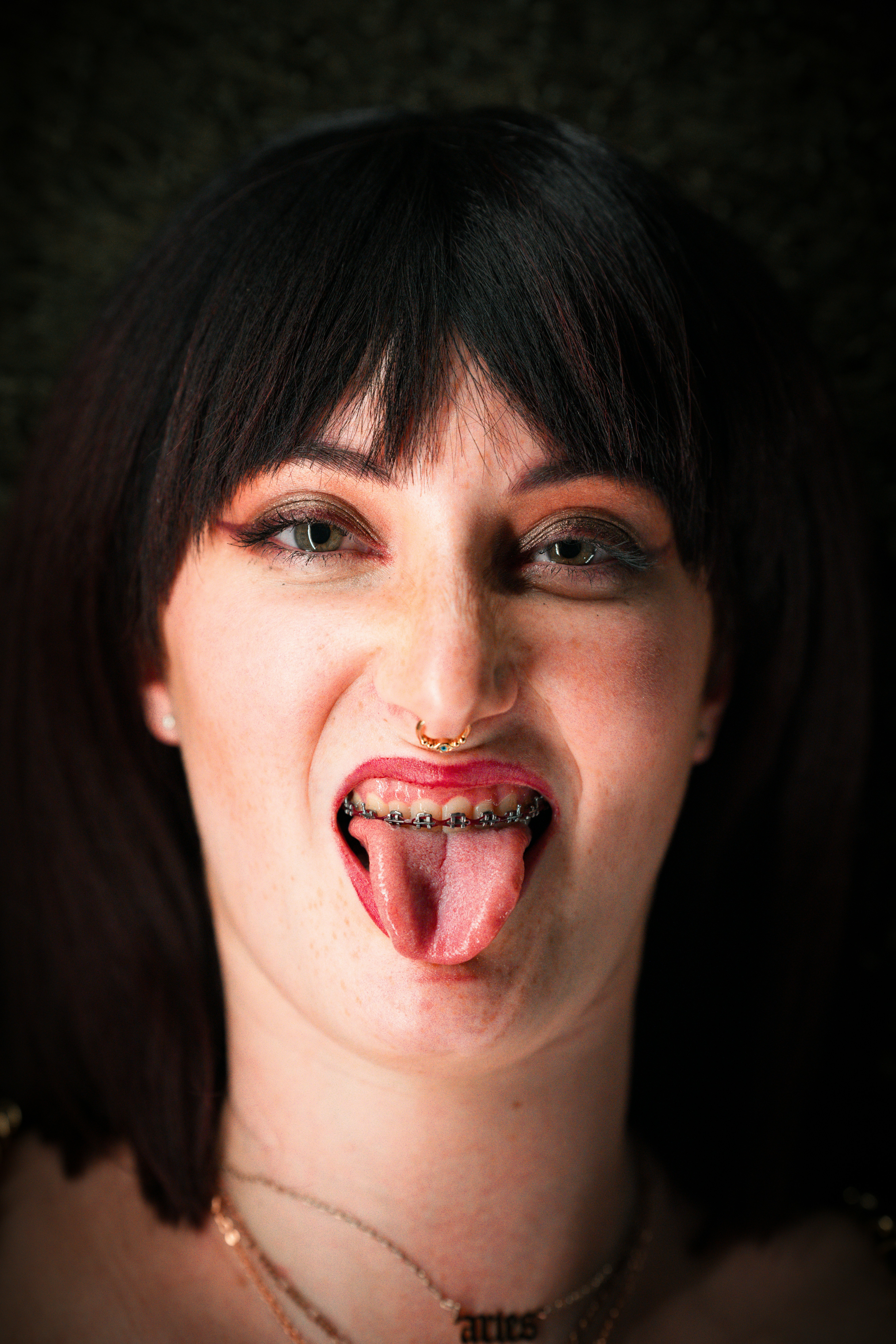 A woman making a weird face with her tongue out photo – Free Medusa ...
