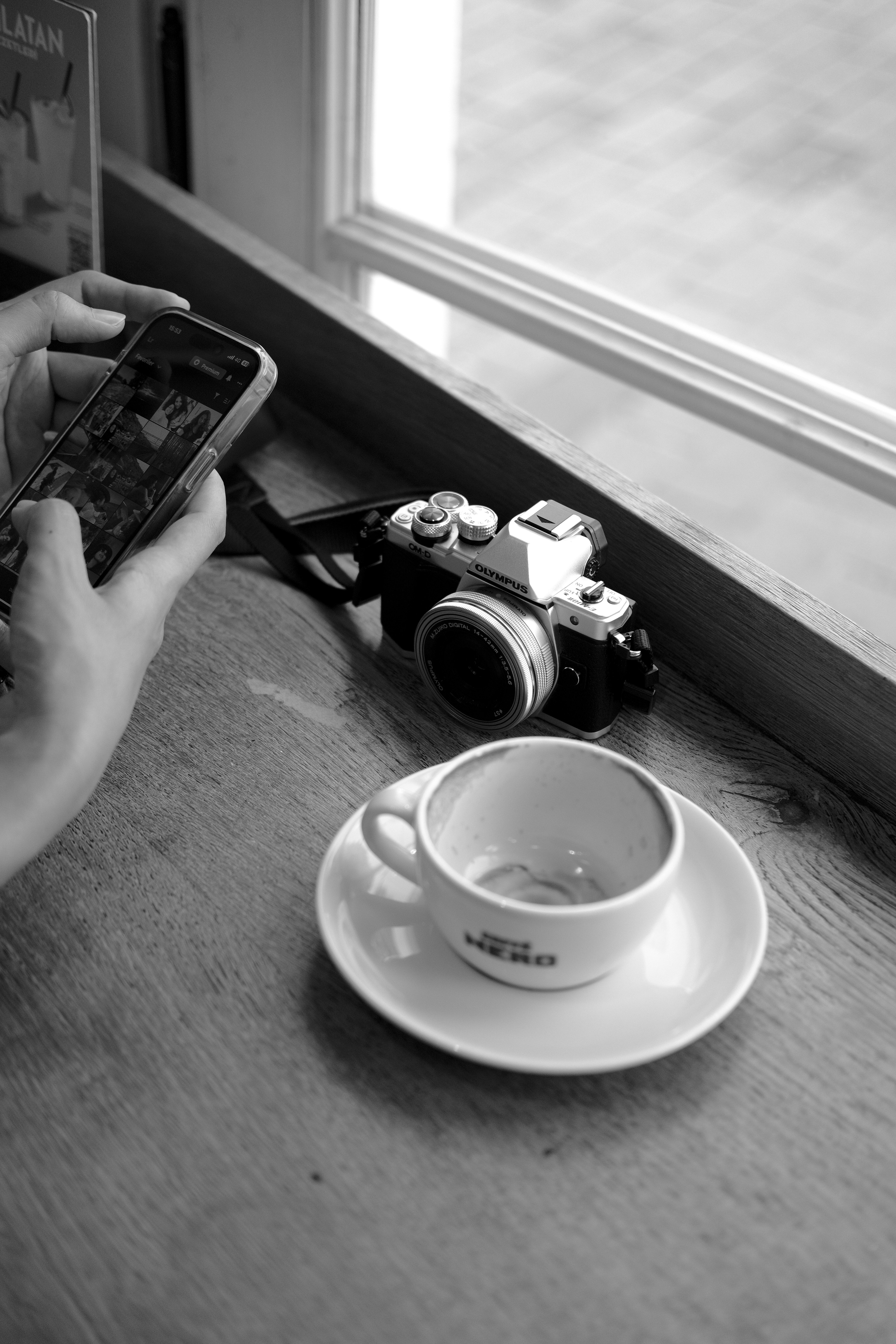 Morning Ritual by the Window: A Vintage Olympus, a Smartphone, and a Steam-Kissed Cup