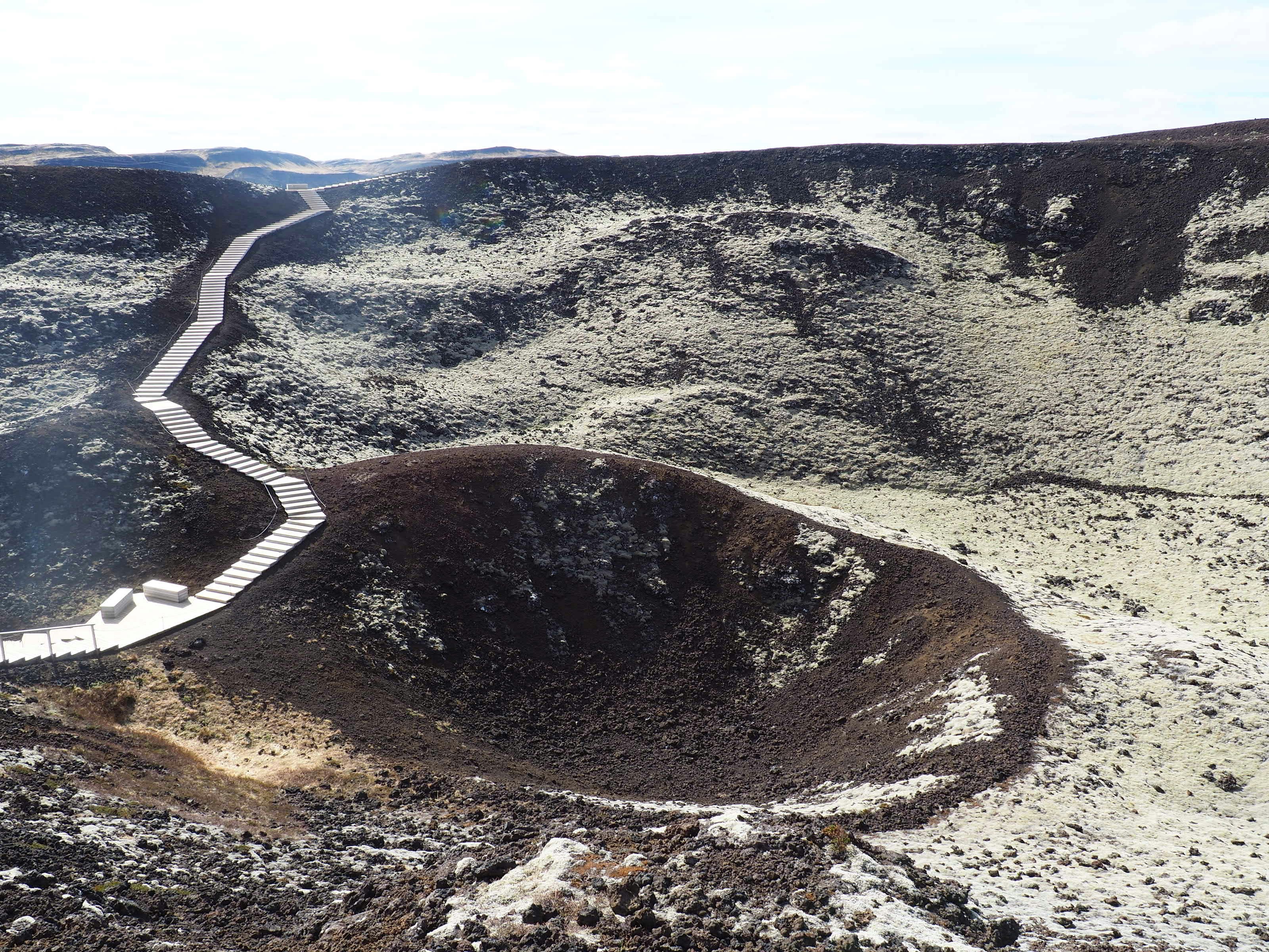 A crater of a massive grey volcano in Iceland
