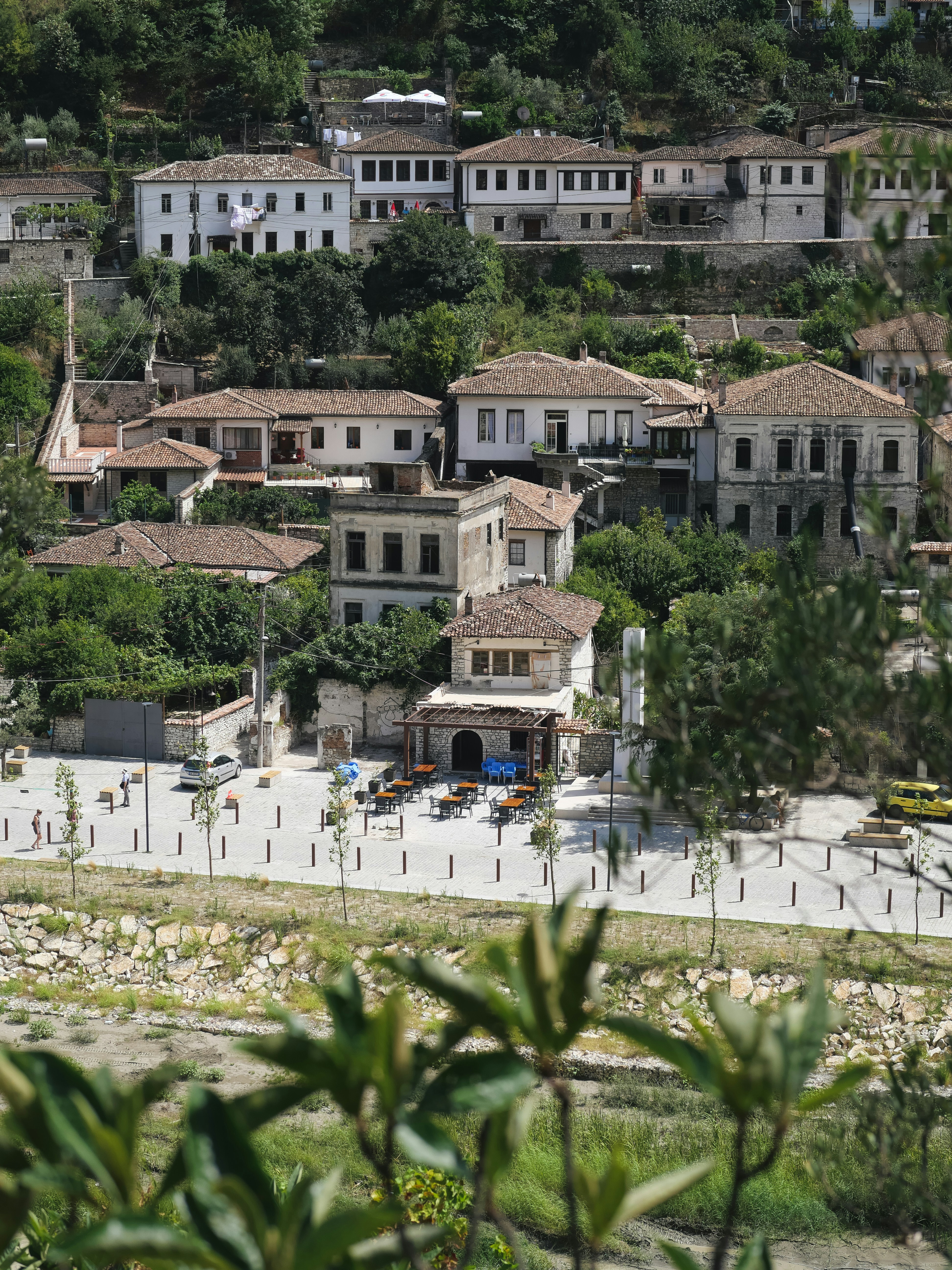 Terraced Hillside Village: A Riverside Café Nestled Among White-Washed Homes