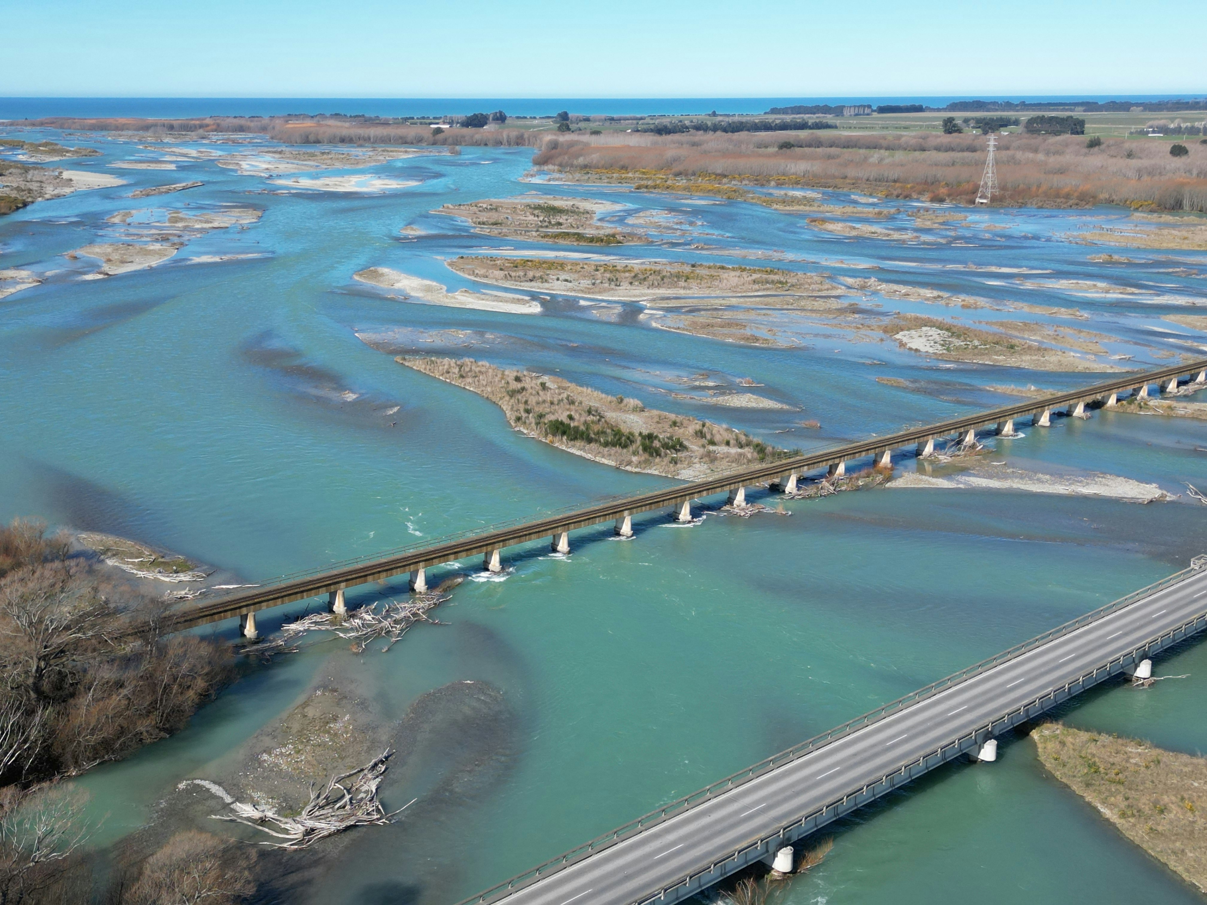 An aerial view of a bridge over a river photo – Free Waitaki river ...