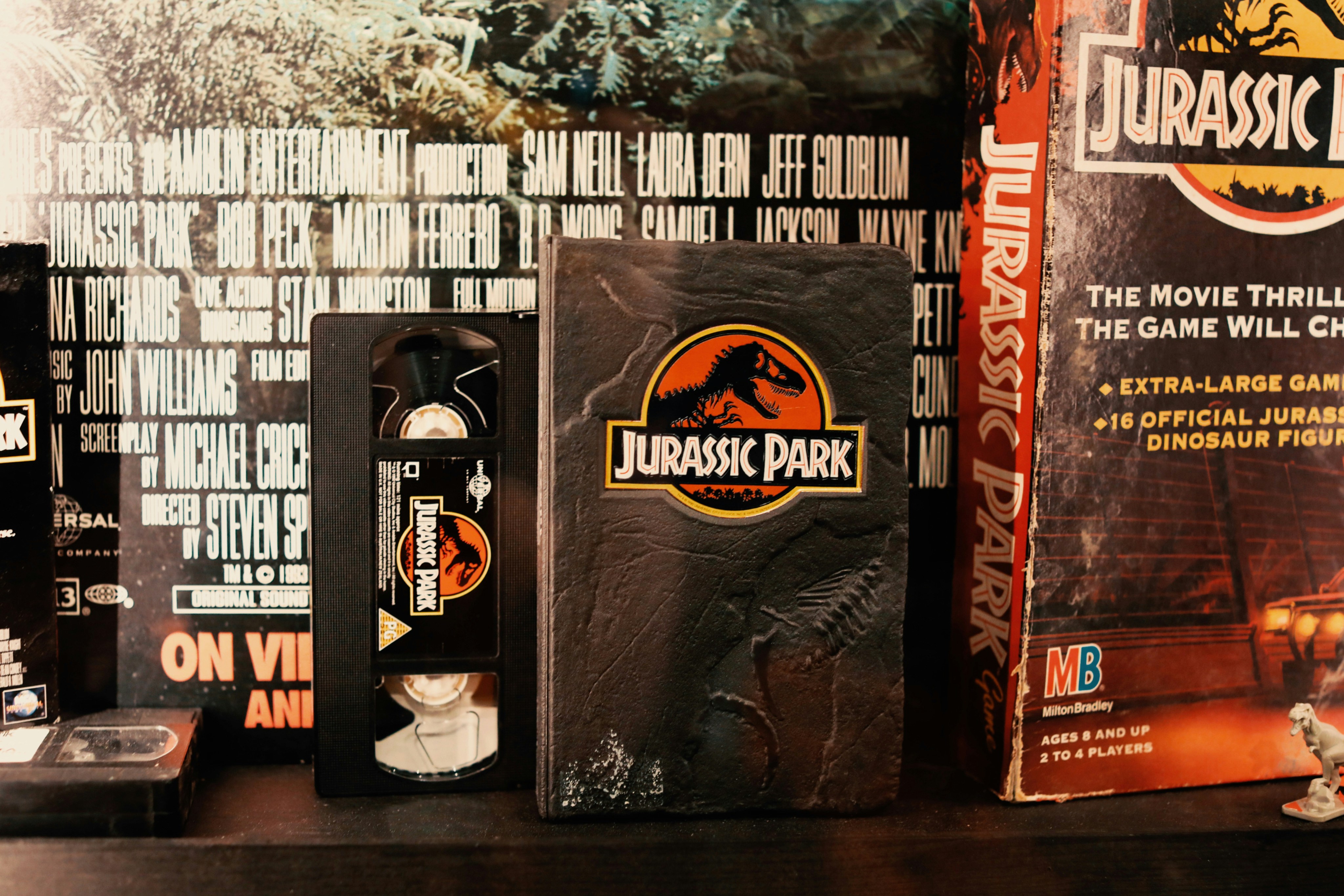 A collection of video game merchandise on a shelf photo – Free Book ...