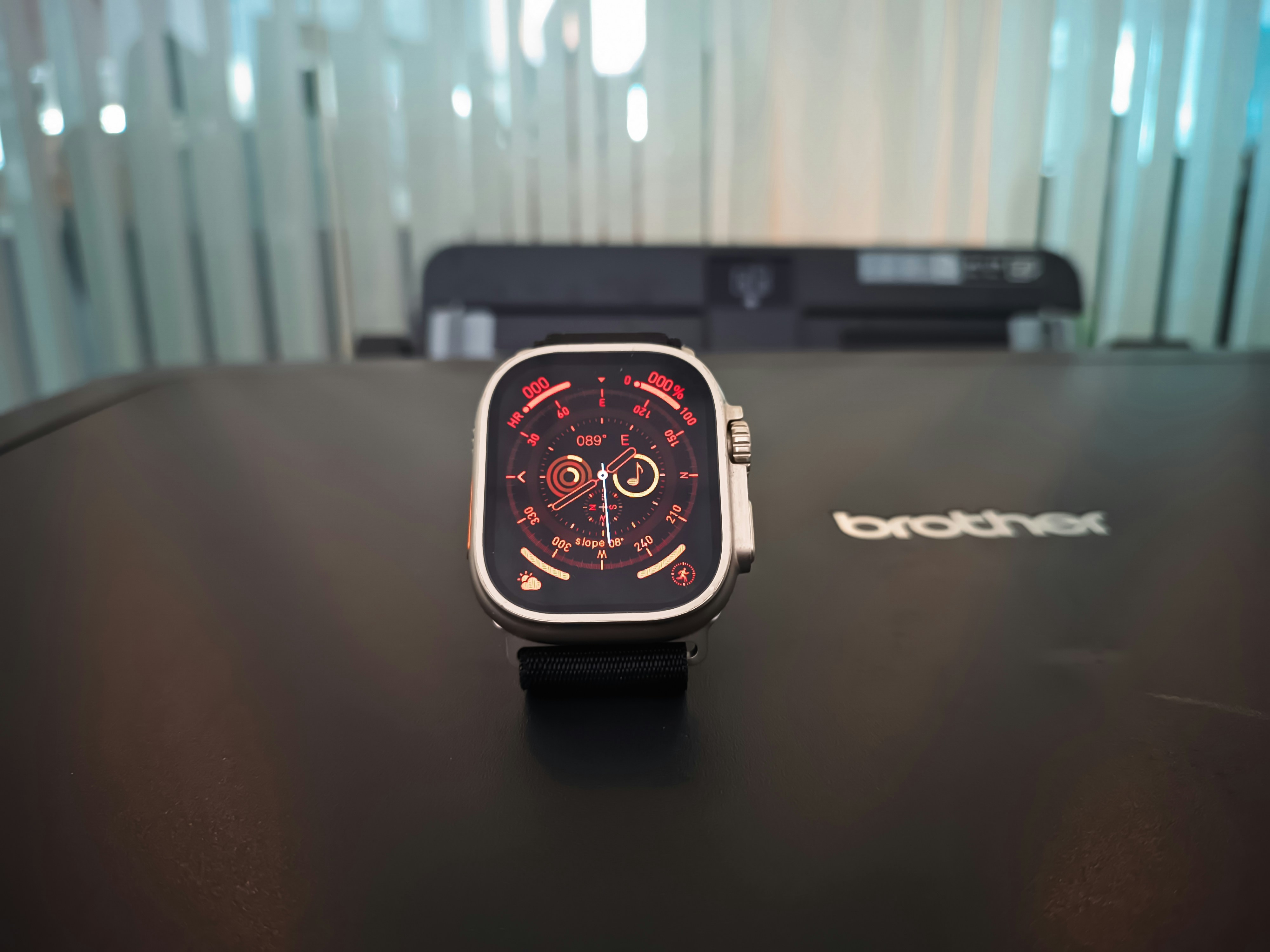 A close up of a smart watch on a table photo – Free Smart watch Image ...