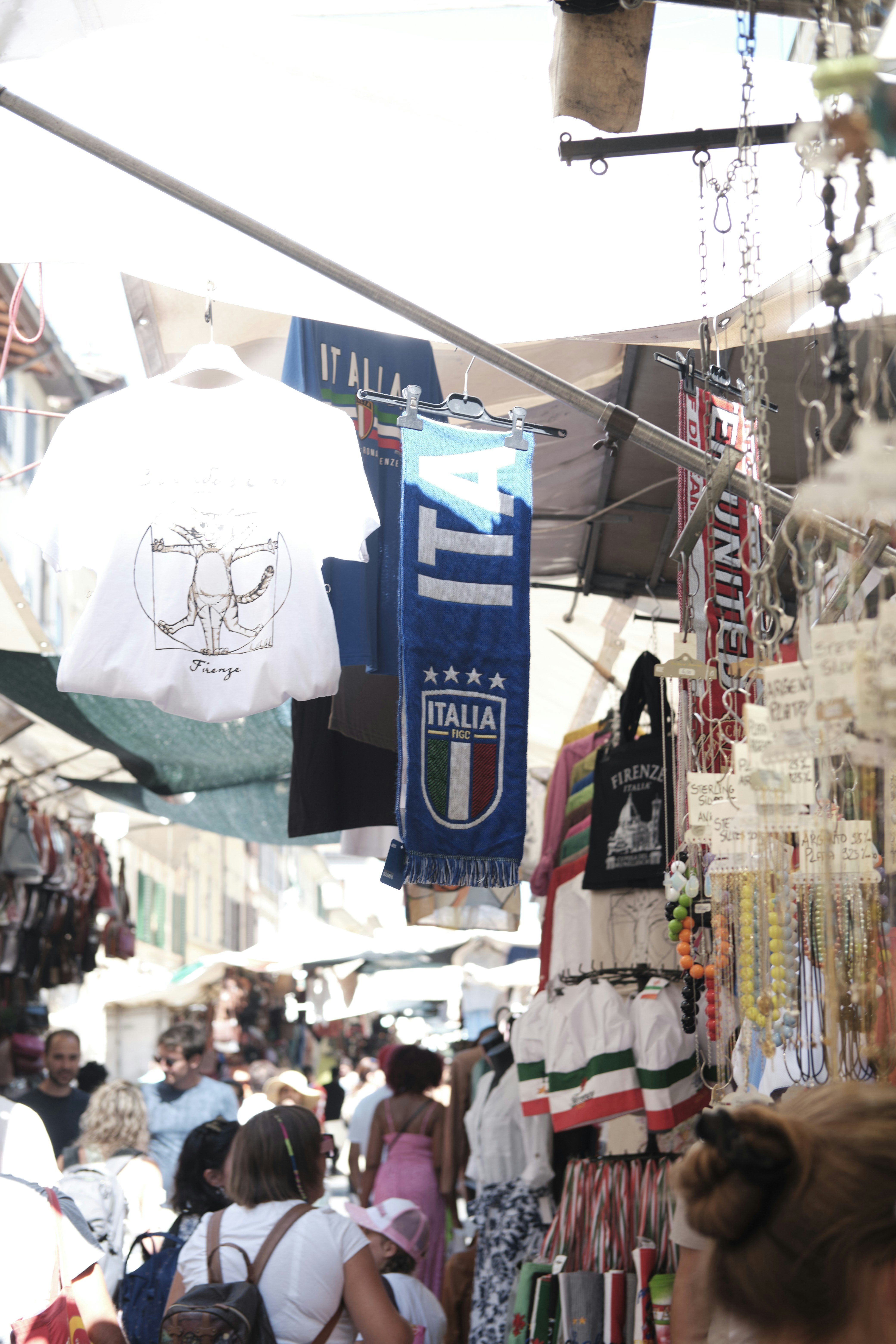 Italia Scarf as a Banner in a Sunlit Market Corridor
