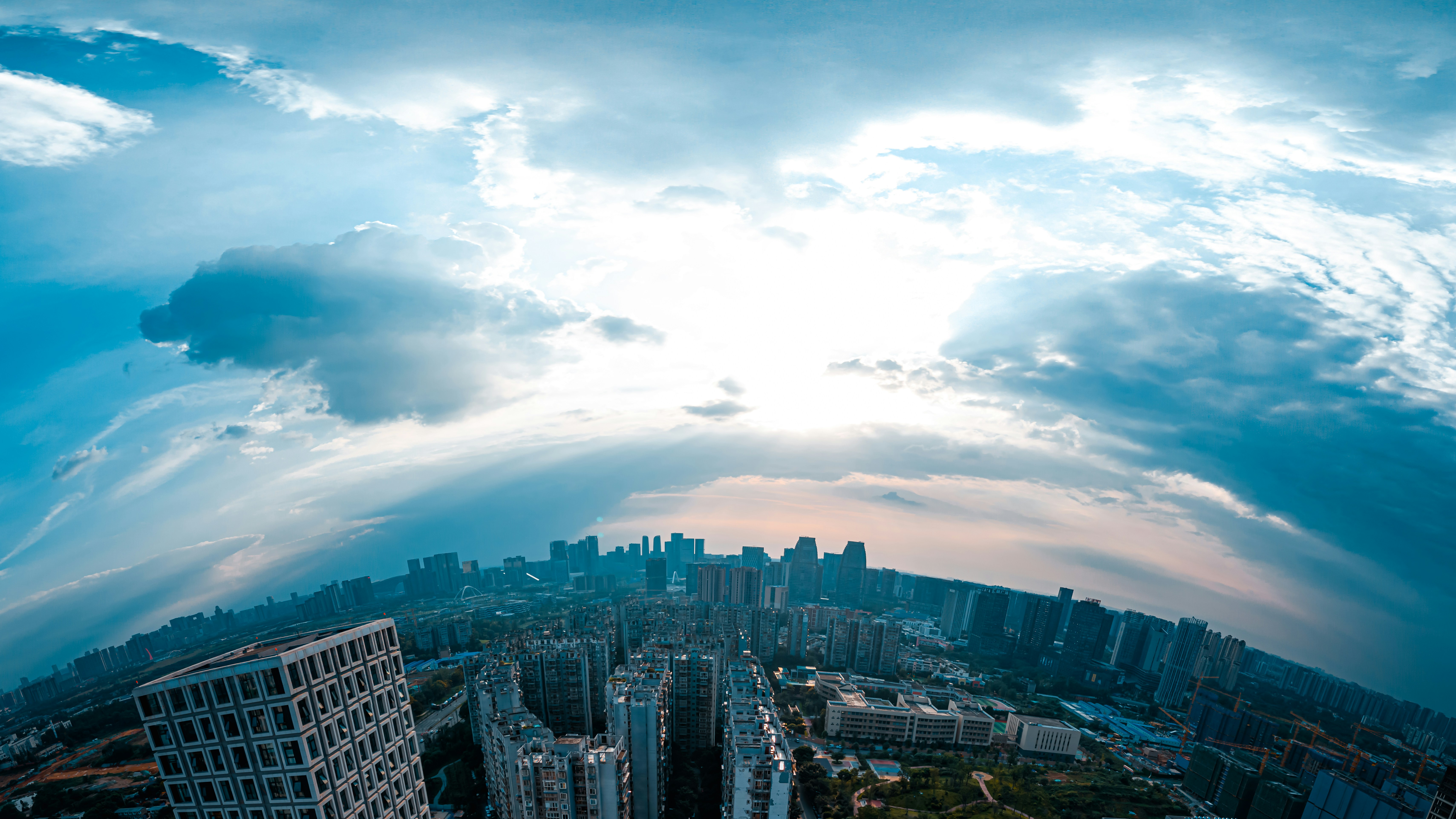 A view of a city from the top of a building photo – Free Building Image ...