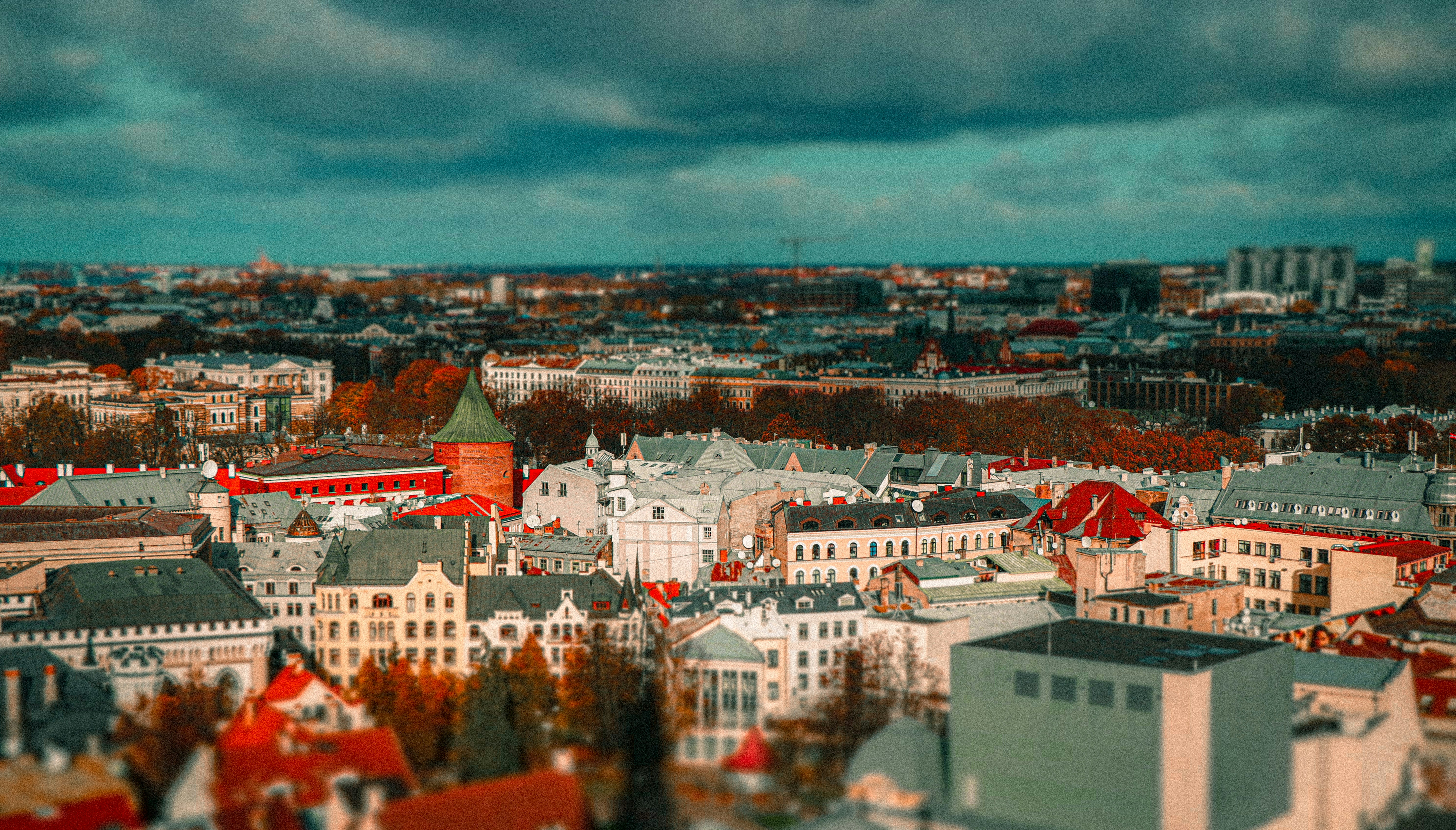 A view of a city from the top of a building photo – Free Riga Image on ...