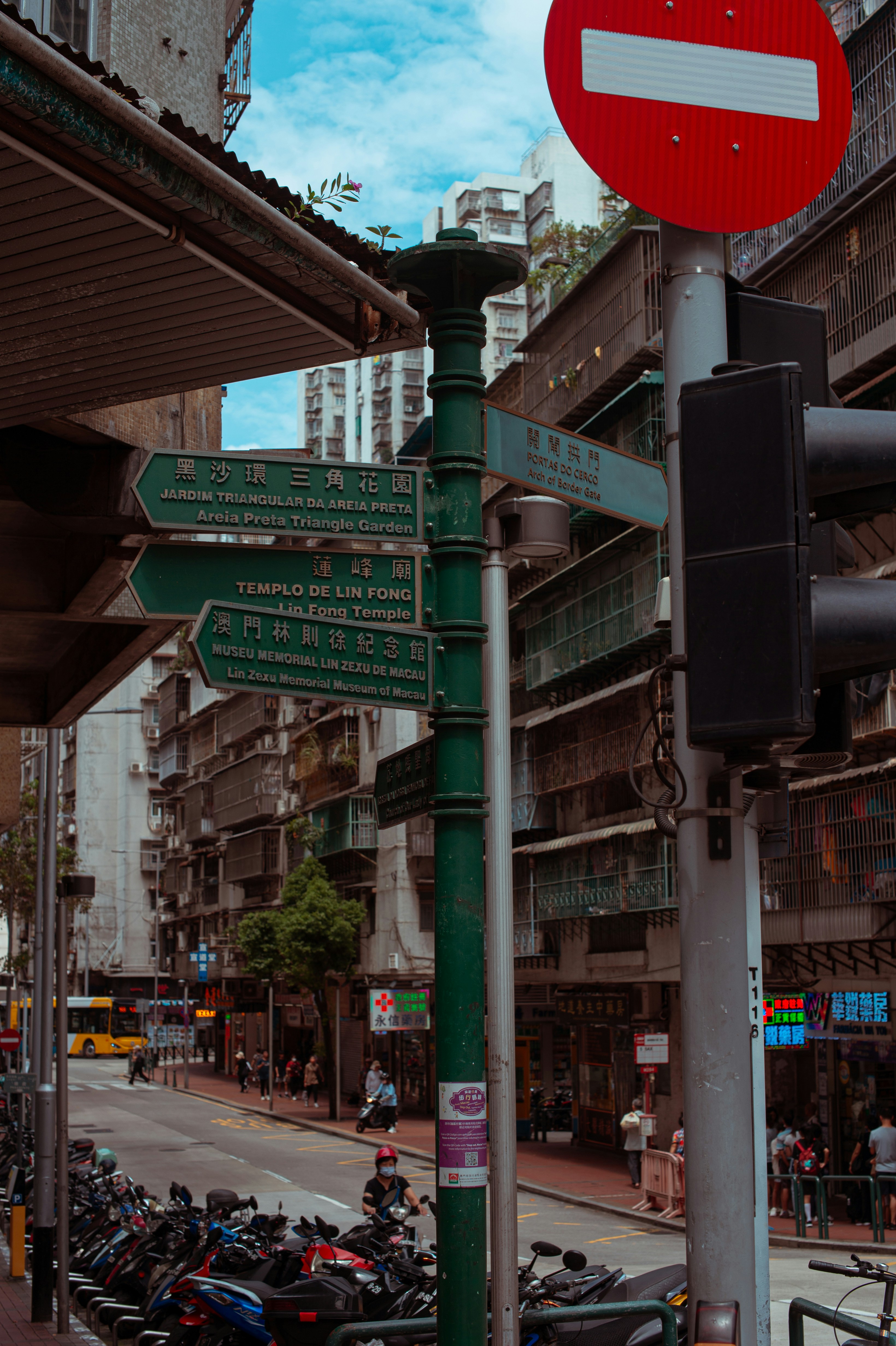 Pole of Signs on a Hong Kong Street Corner