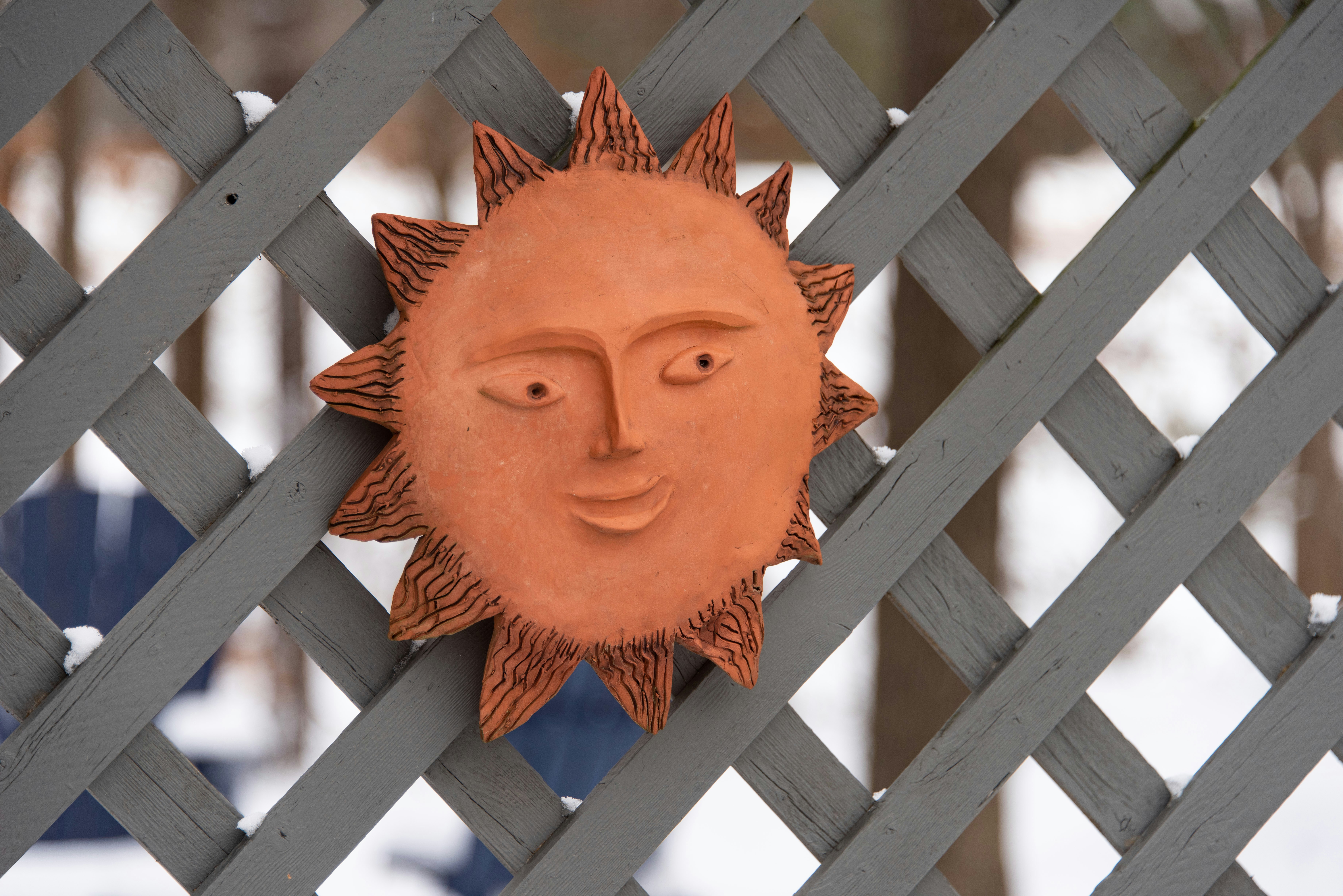 Terracotta Sun Pendant Framed by Frosted Lattice