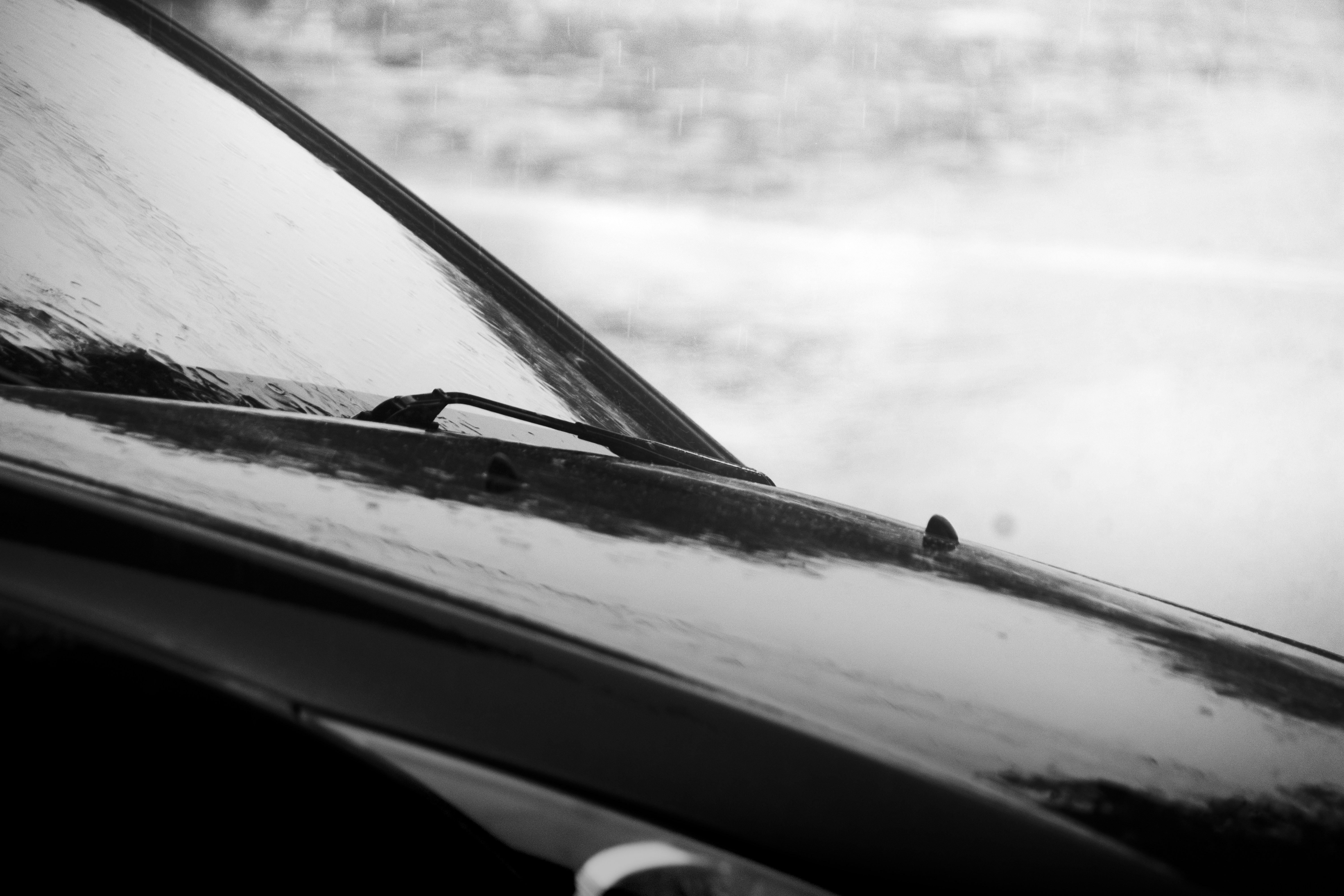 A close up of the windshield of a car photo – Free Windshield Image on ...