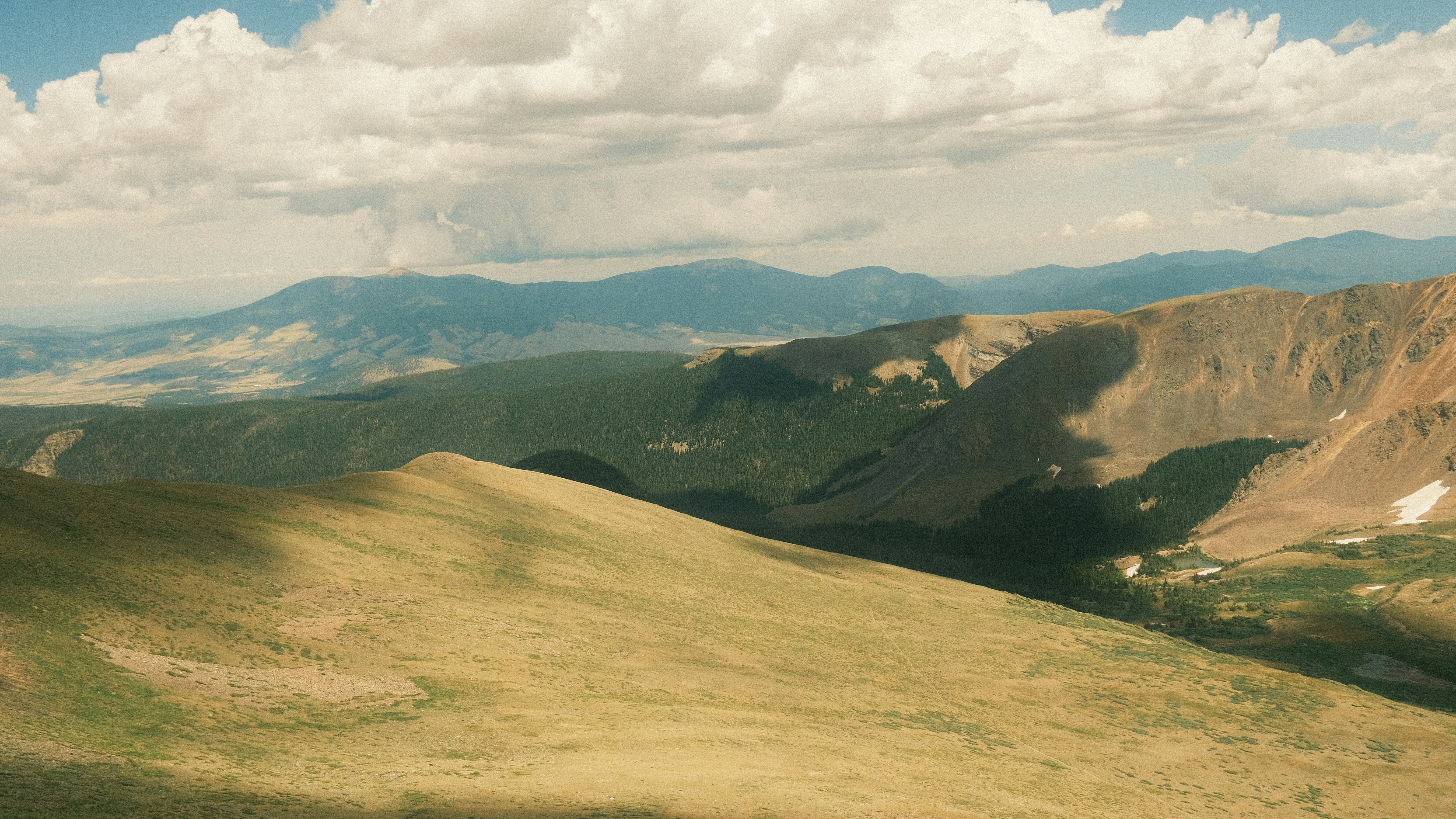 A view of the mountains from a high point of view photo – Free Land ...