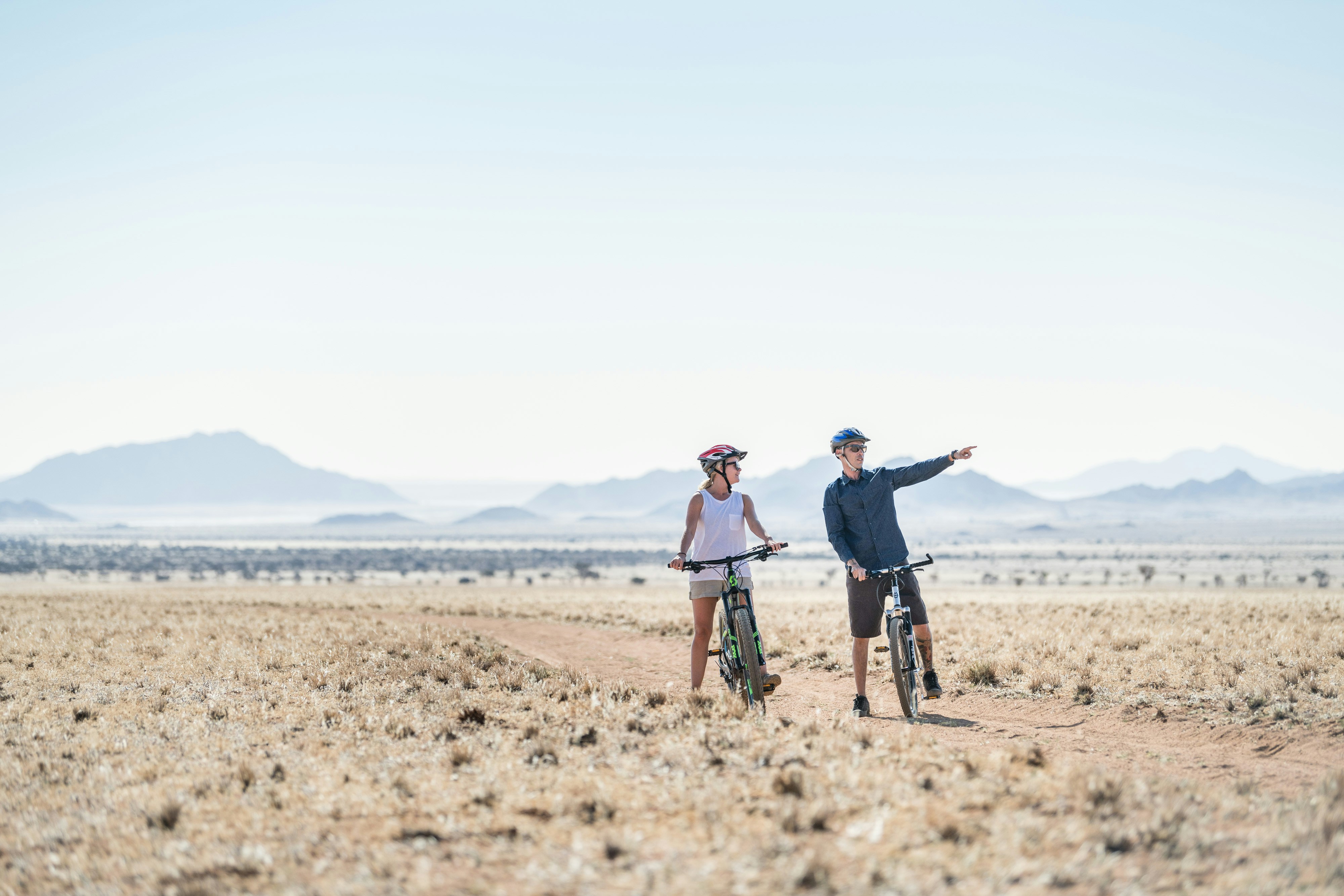 Trailbound Duo: Riding Through a Desert Wake