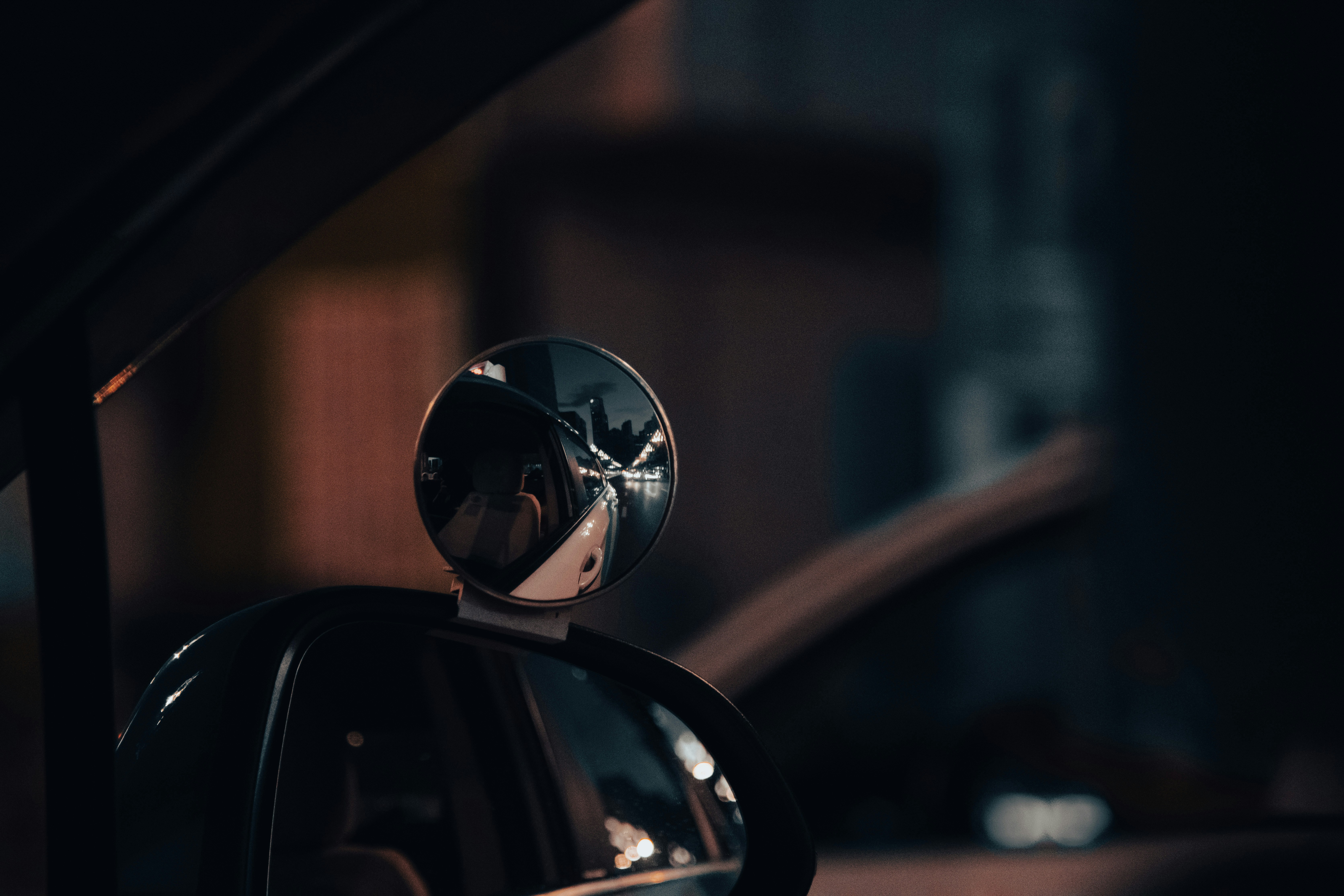 Nocturnal Side Mirror: A Quiet Eye on the Street