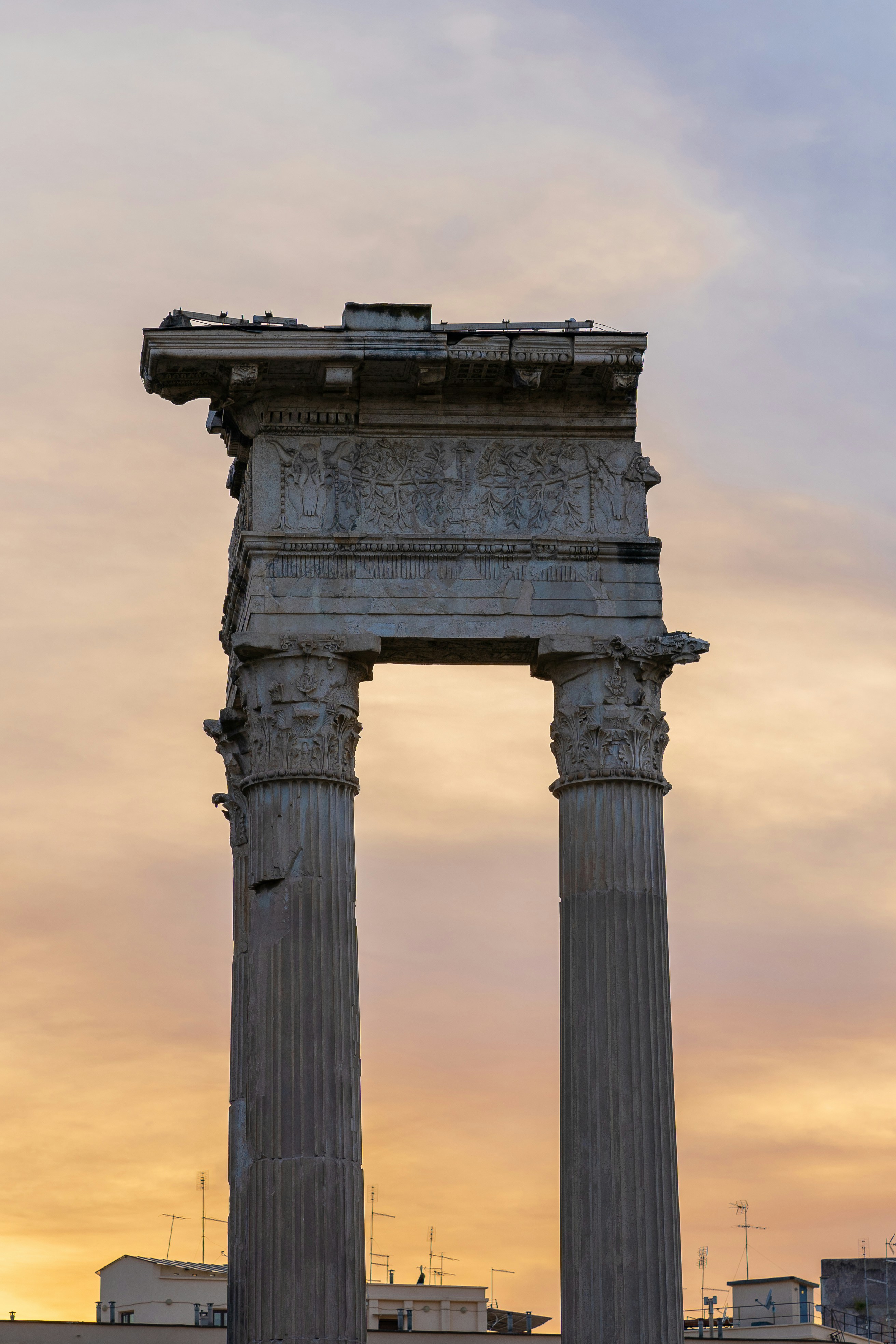 A very tall stone structure with two columns photo – Free Rome Image on ...