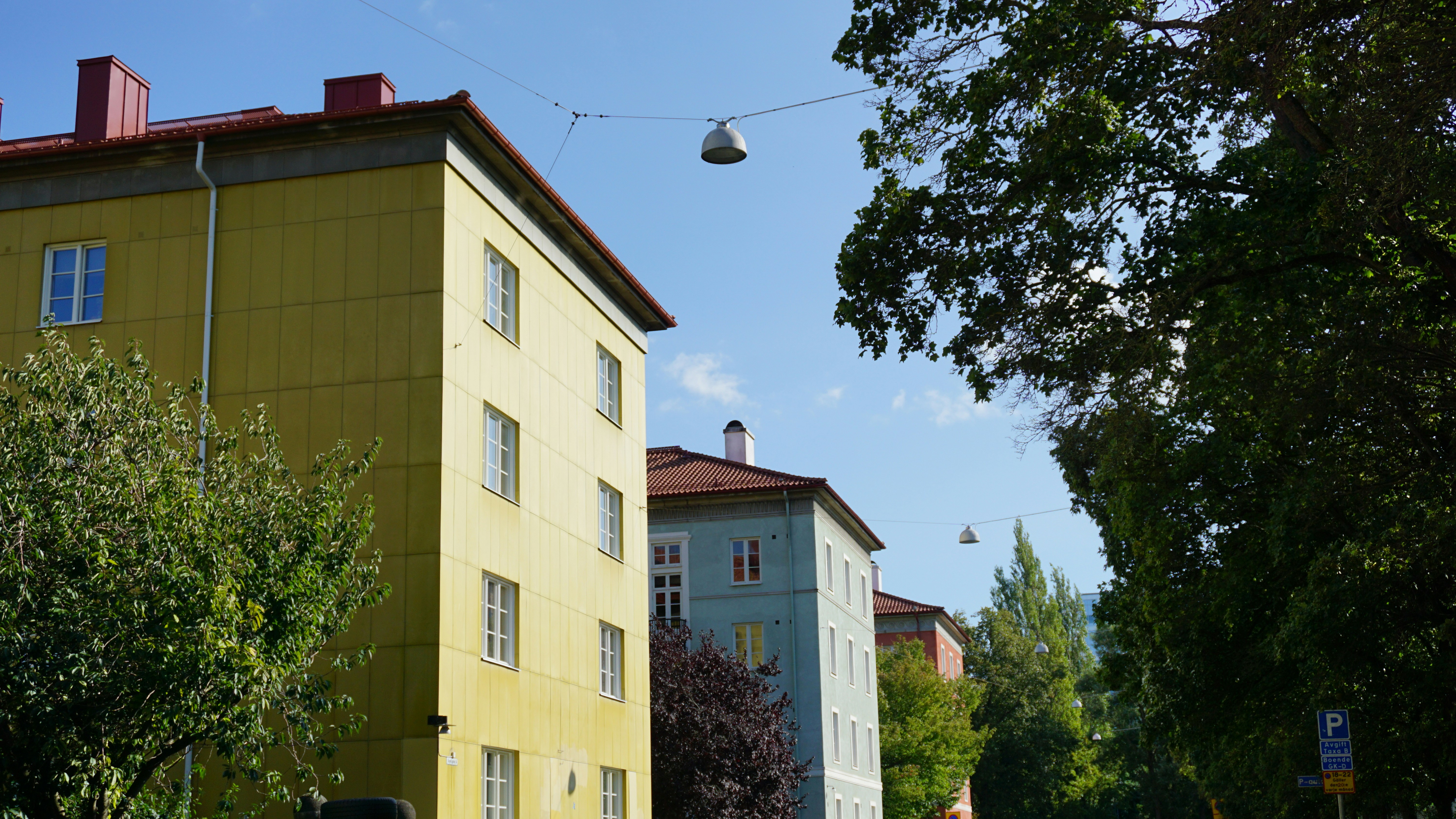 Pastel Facades on a Sunlit Street