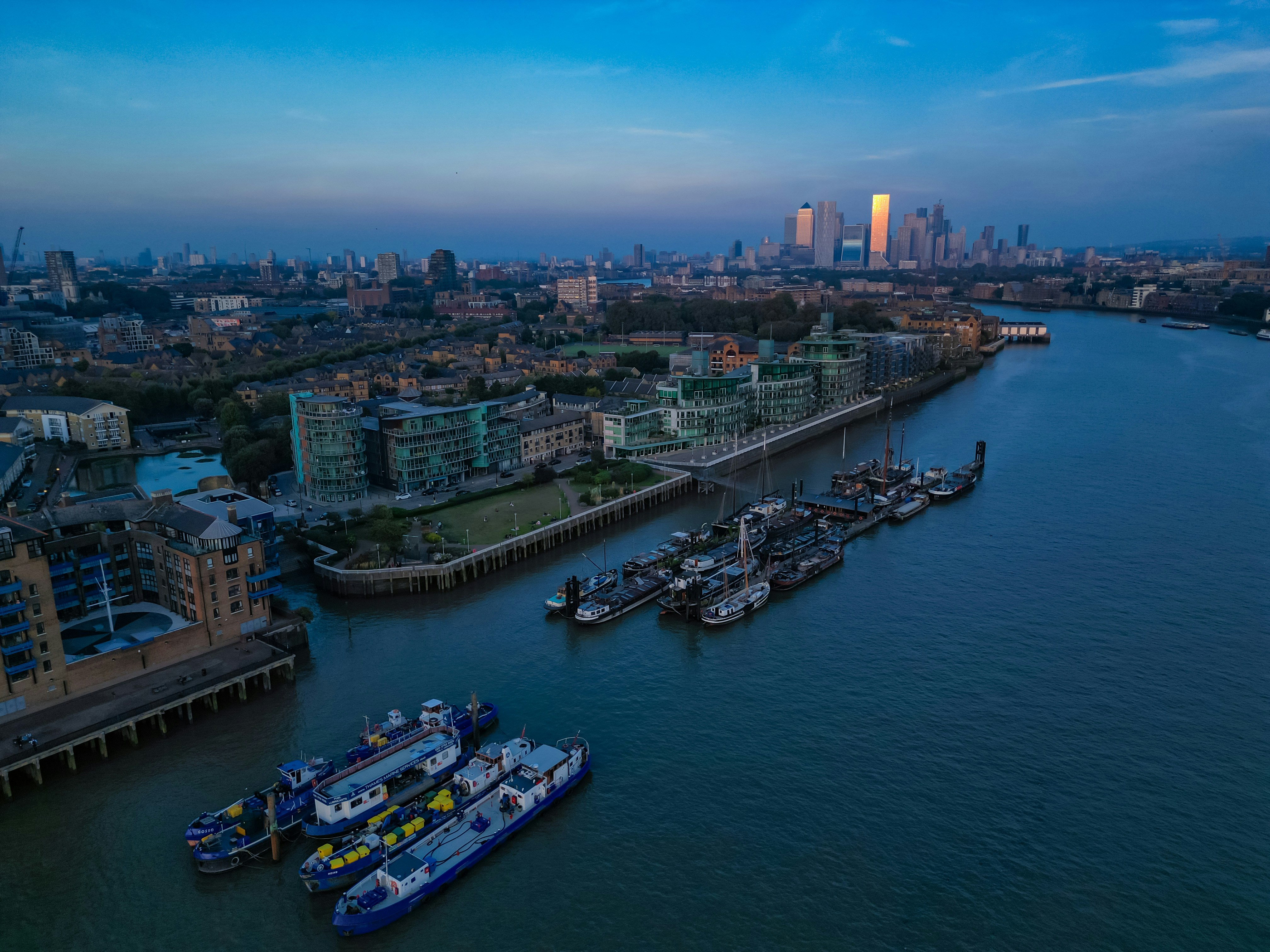 Emberlight Skyline Over a Winding Riverside