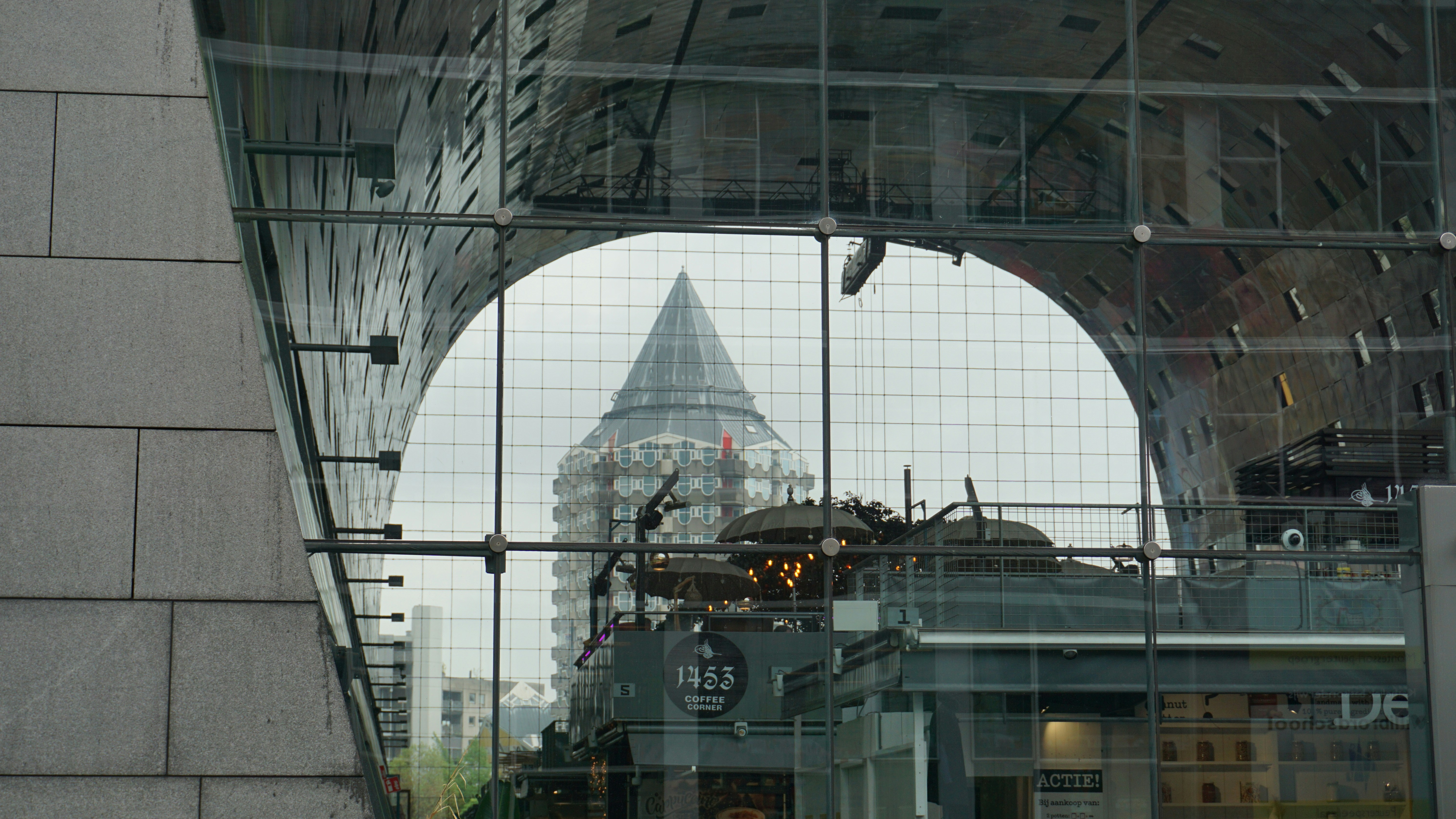 A reflection of a clock tower in the glass of a building photo – Free ...