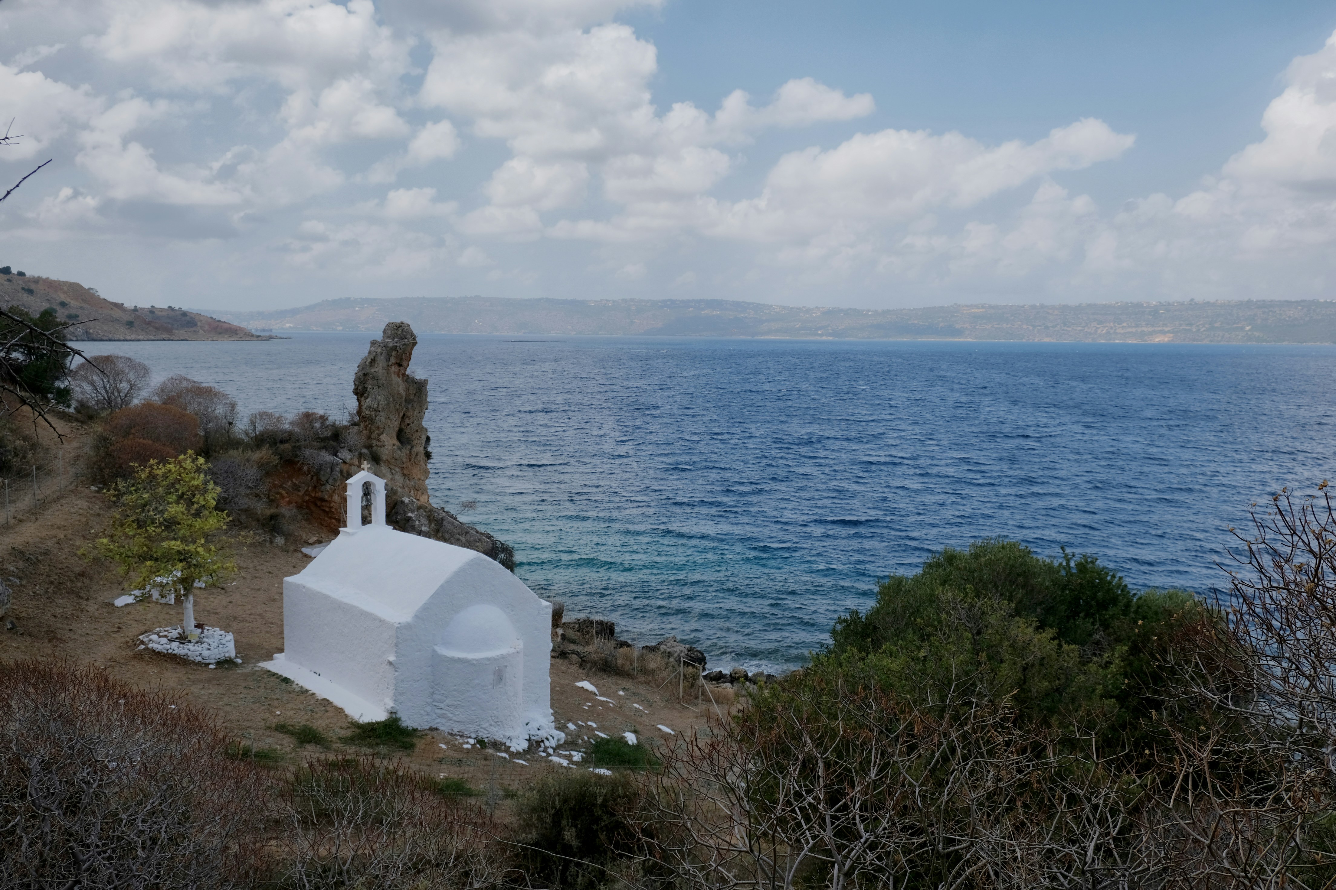 White Chapel by the Sea: A Quiet Coastal Shrine at Dusk
