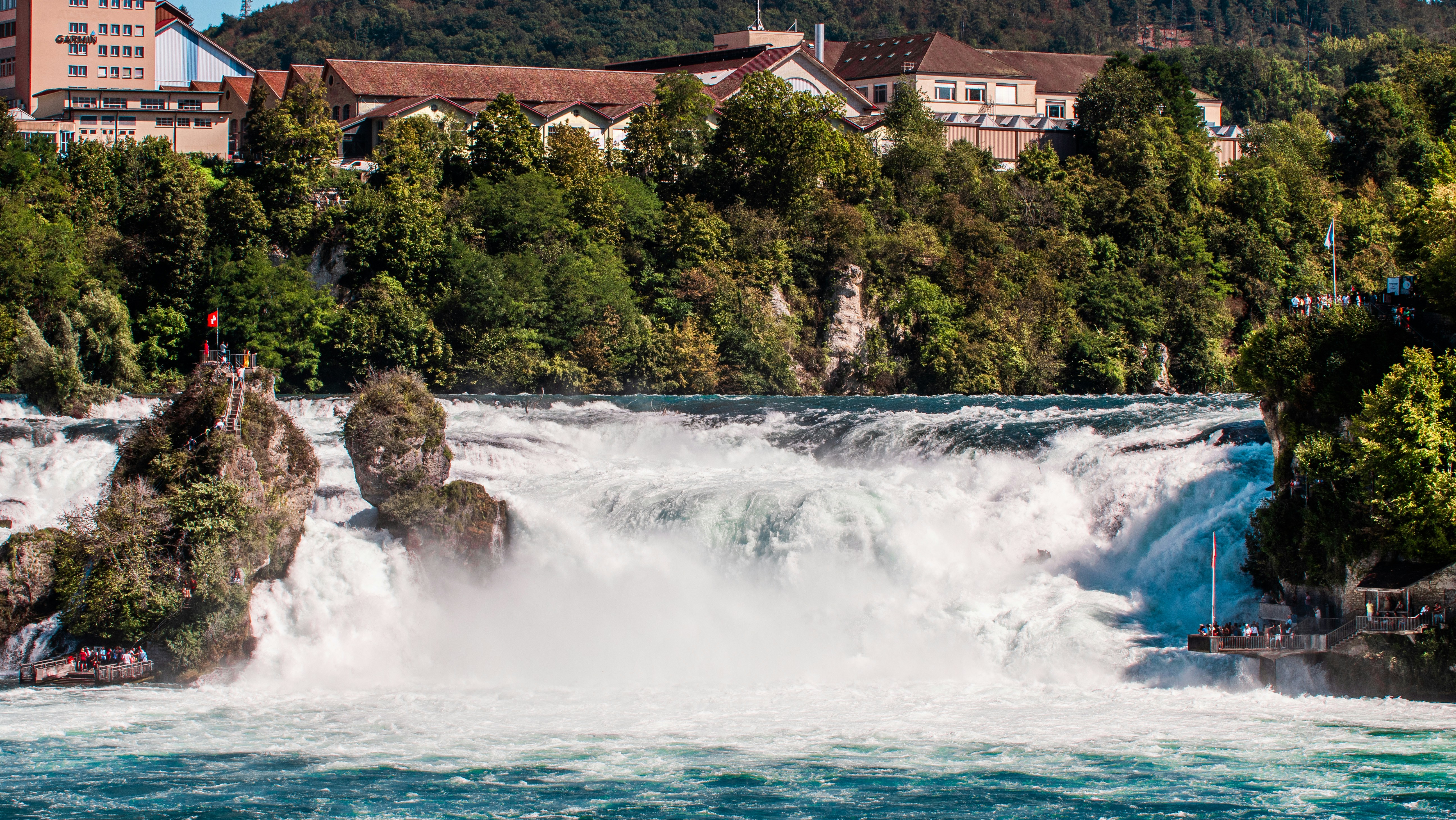 A large waterfall in the middle of a river photo – Free Rheinfall Image ...