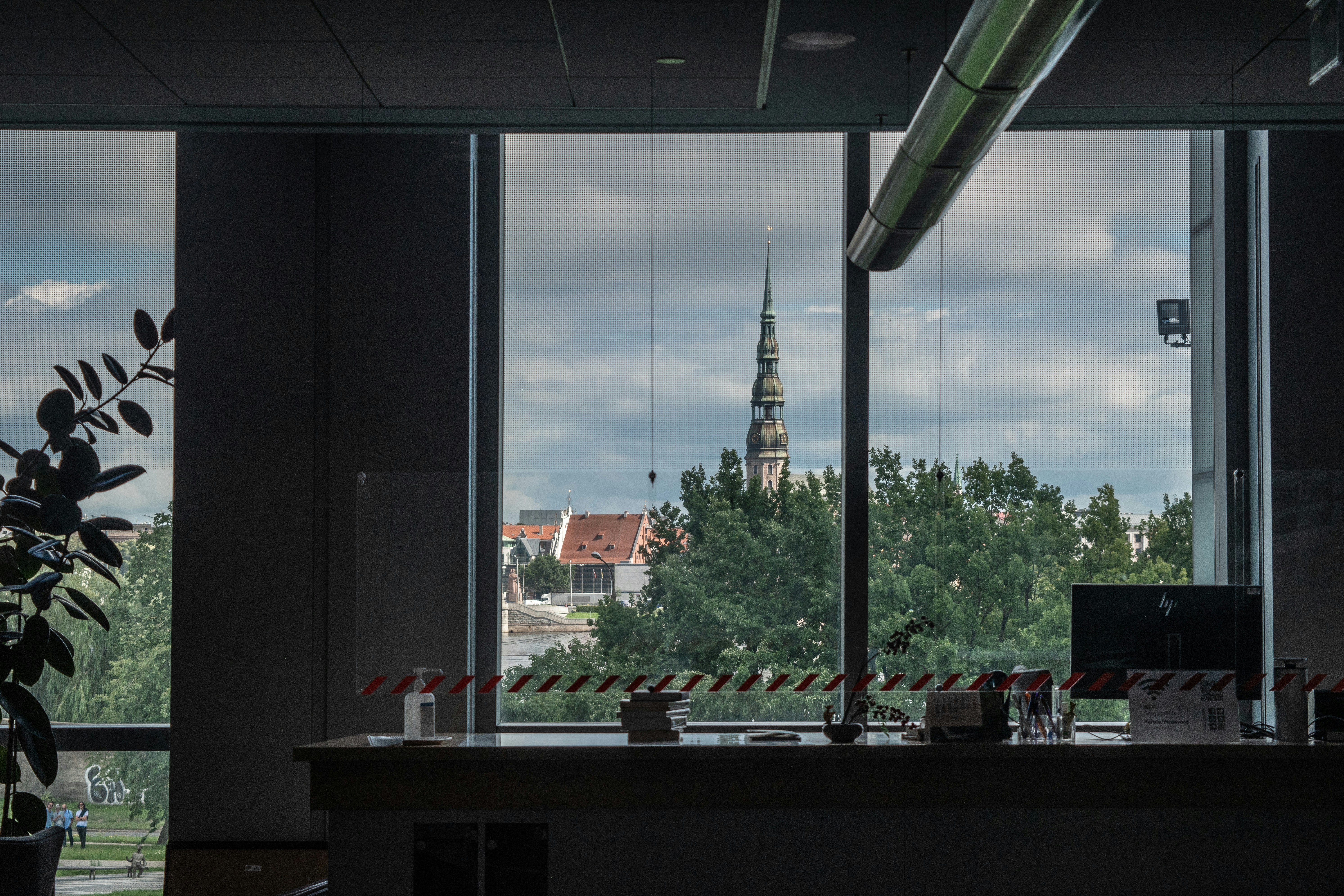 A view of a building through a window photo – Free Window Image on Unsplash