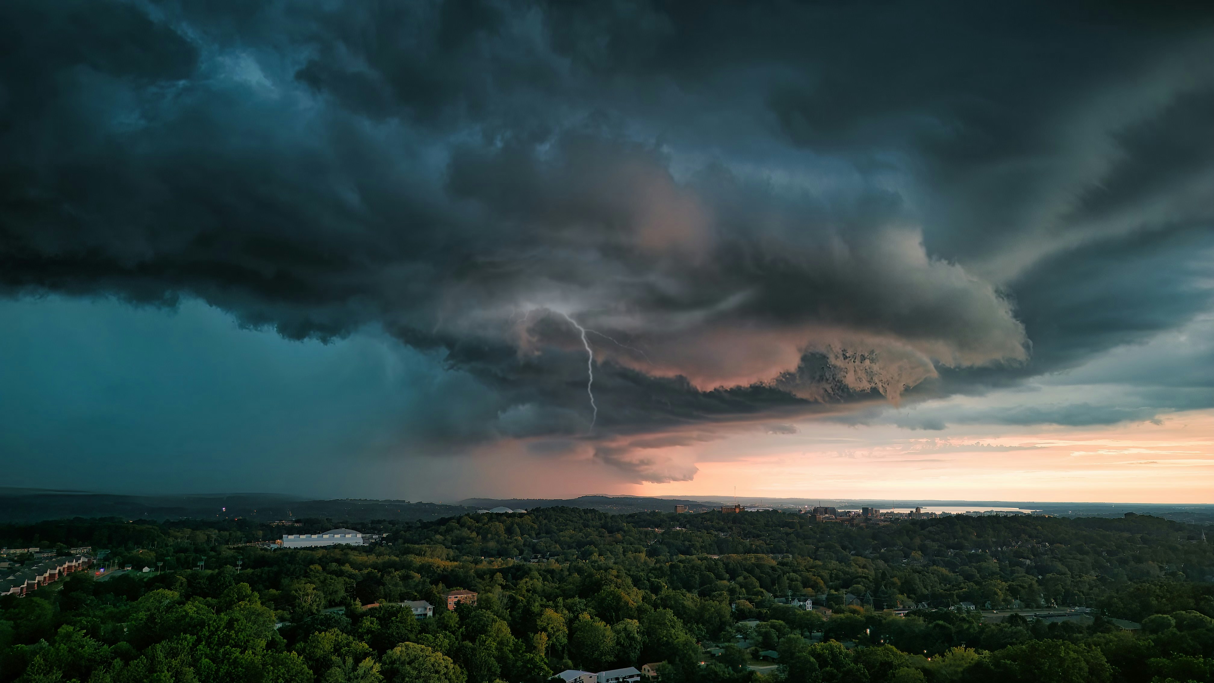 Lightning Thread Across a Suburban Horizon at Dusk