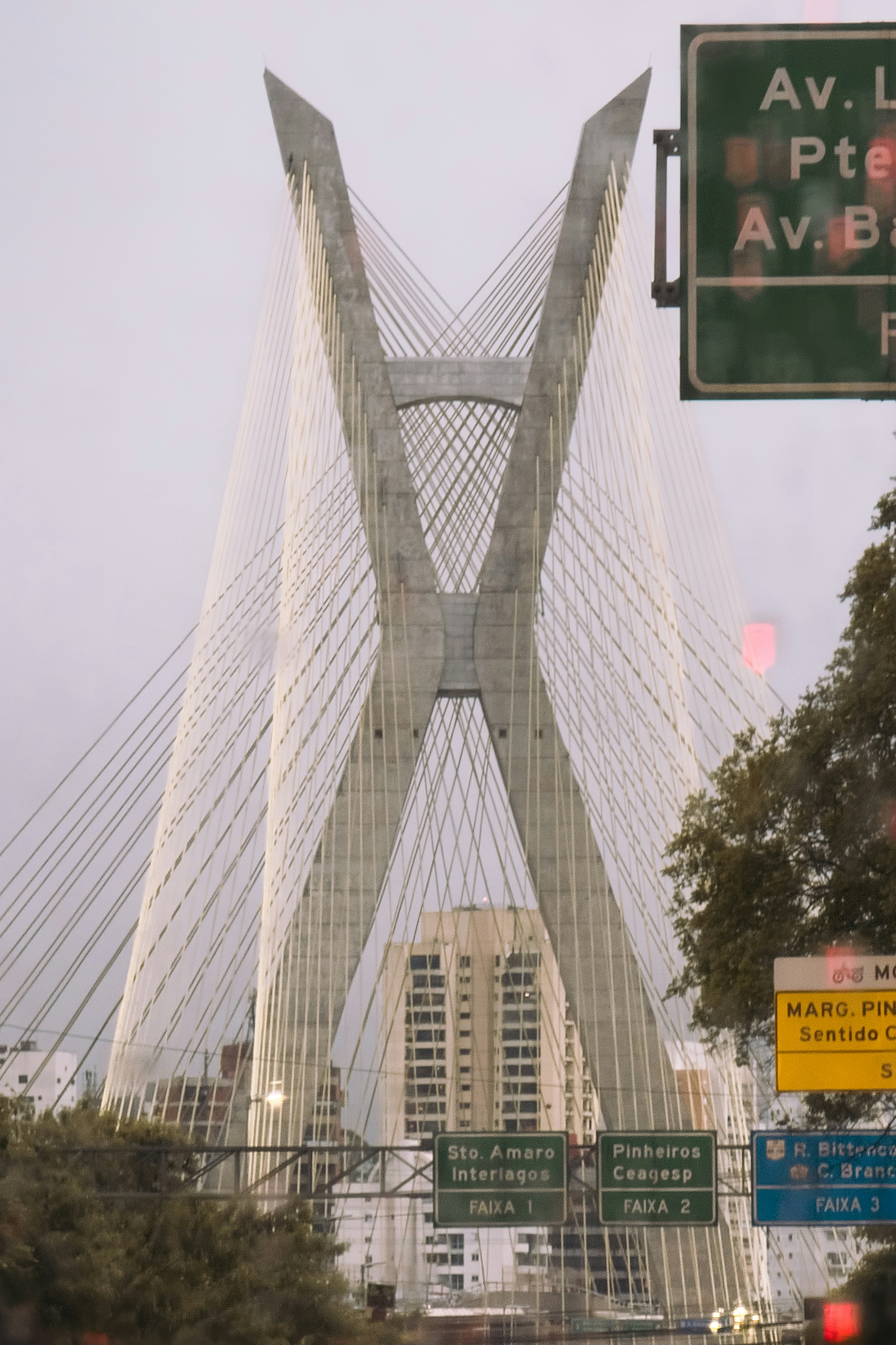 A very tall bridge with a lot of traffic on it photo – Free Bridge ...