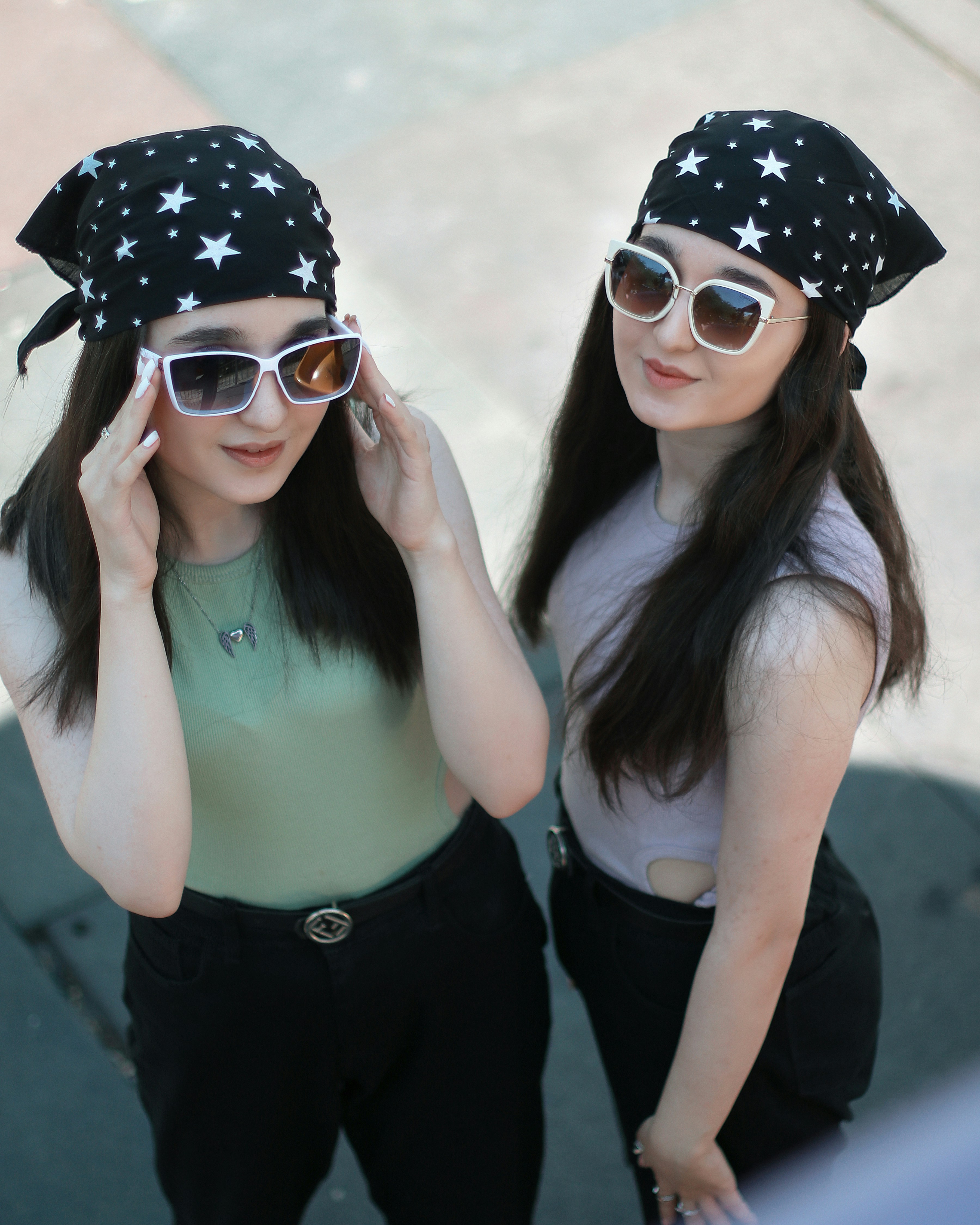 Two girls with sunglasses and stars on their hats photo – Free Woman ...