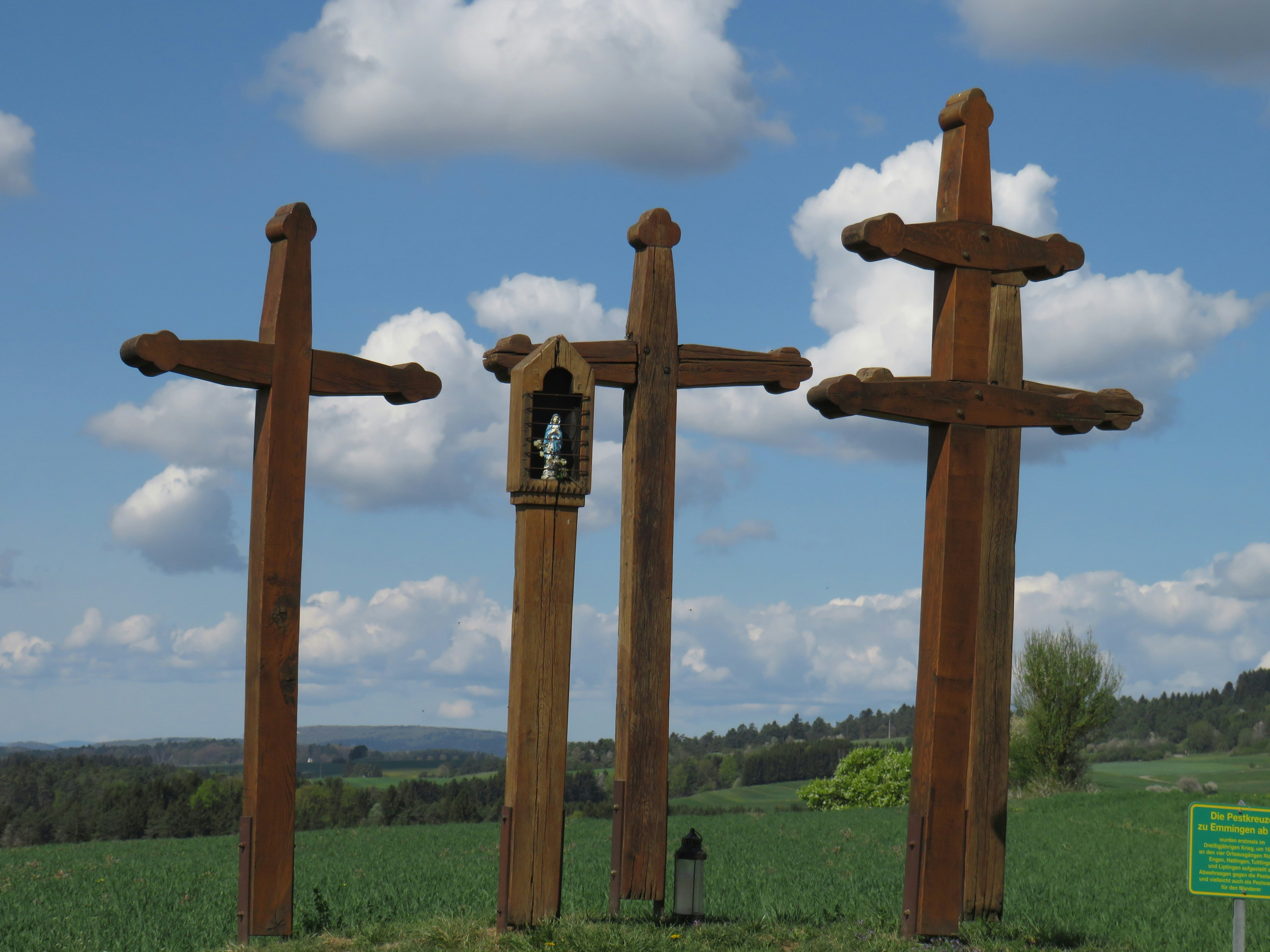 A group of wooden crosses in a field photo – Free Religious cross Image ...