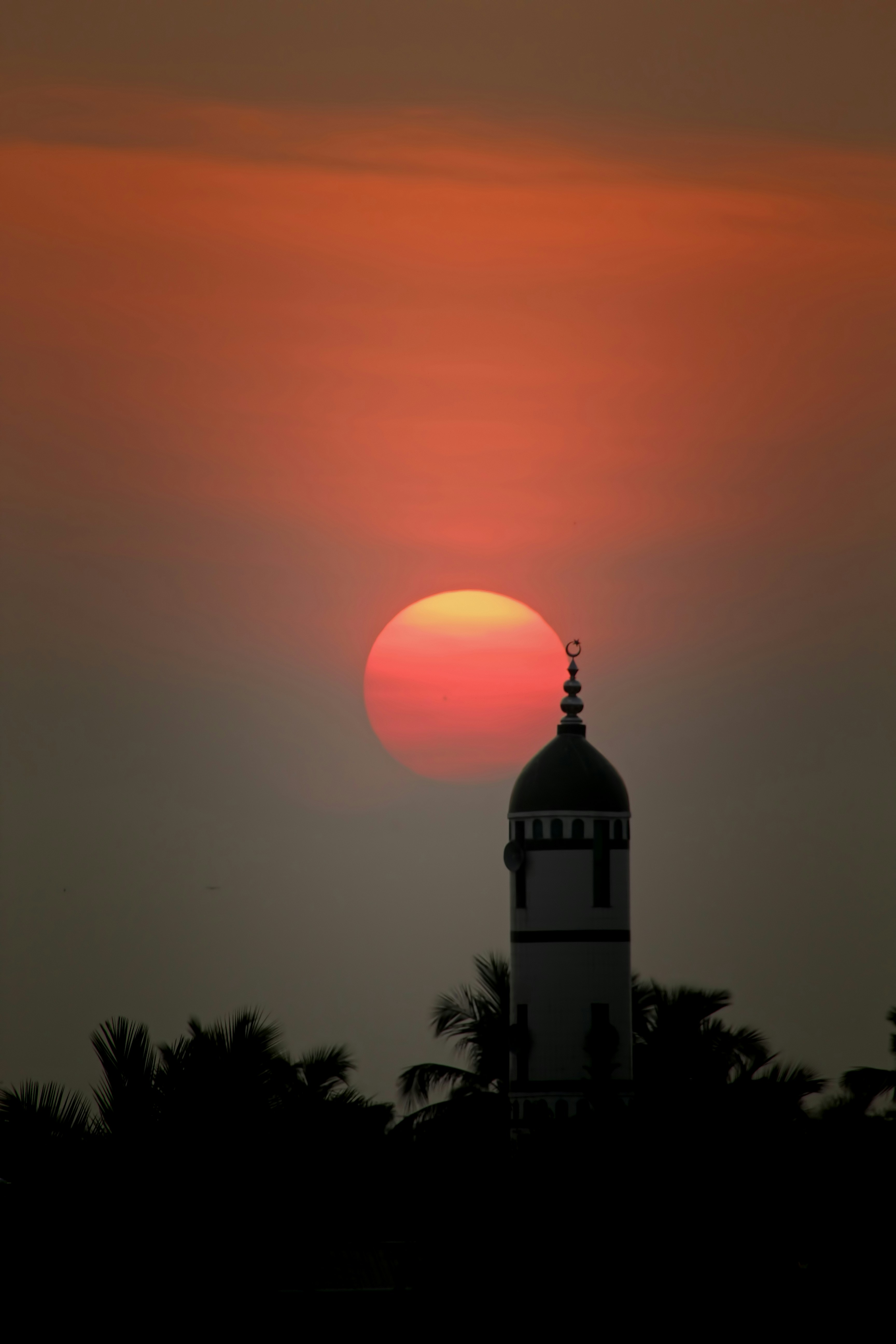Crimson Sundown Behind a Silent Minaret
