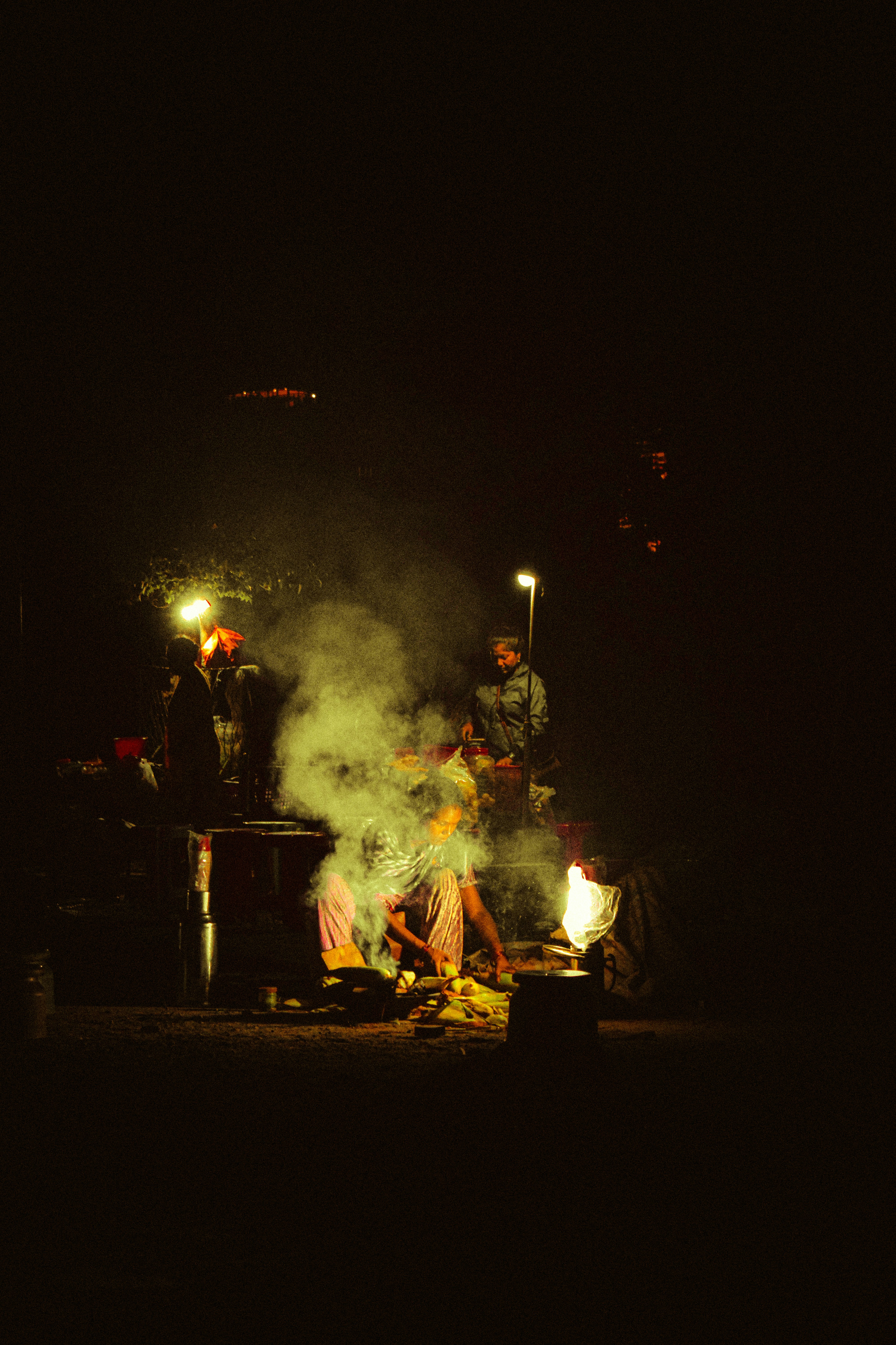 Midnight Ember Circle: Faces Gathered Around a Quiet Fire