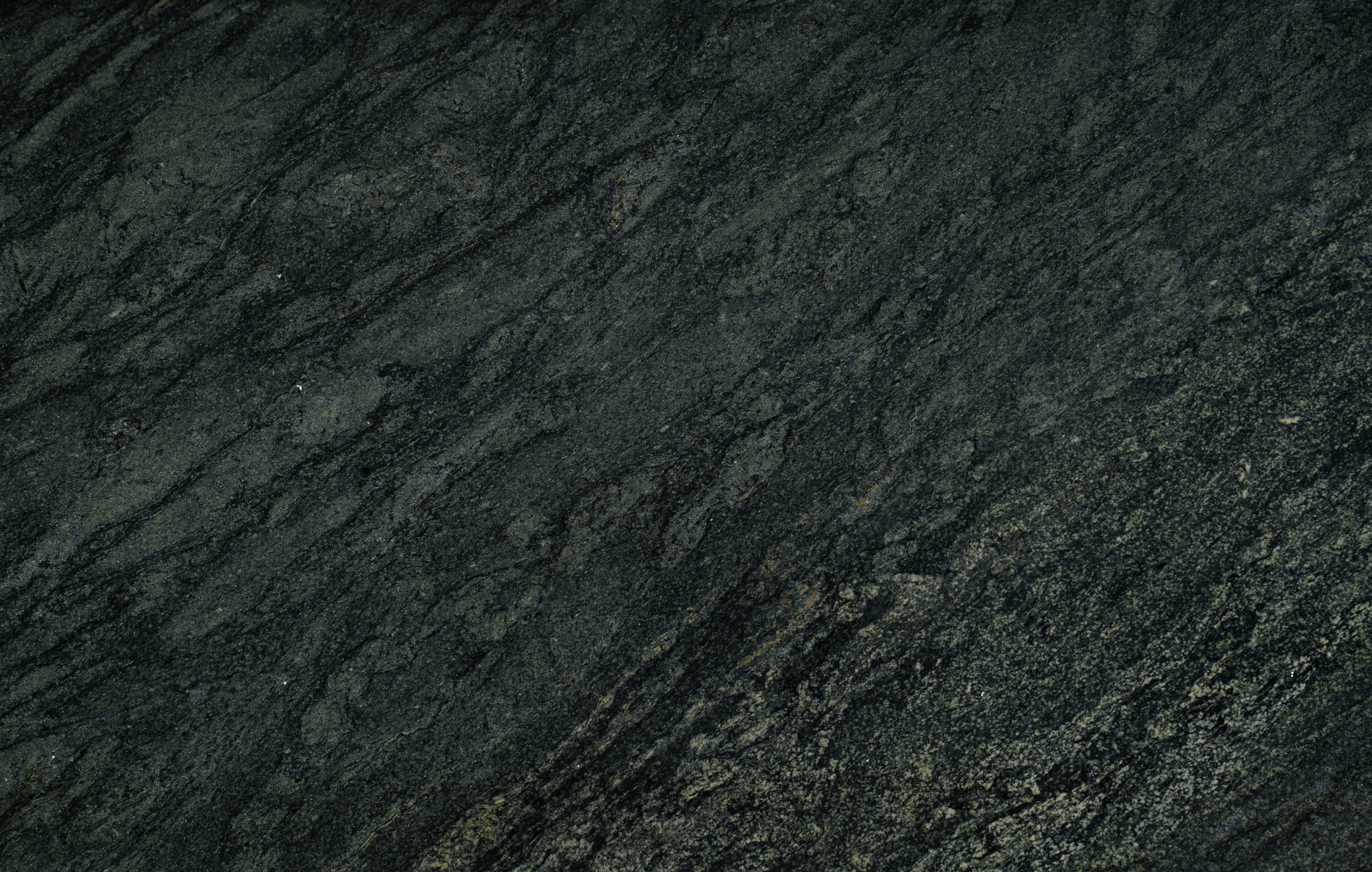 A close up of a black marble surface photo – Free Rock Image on Unsplash