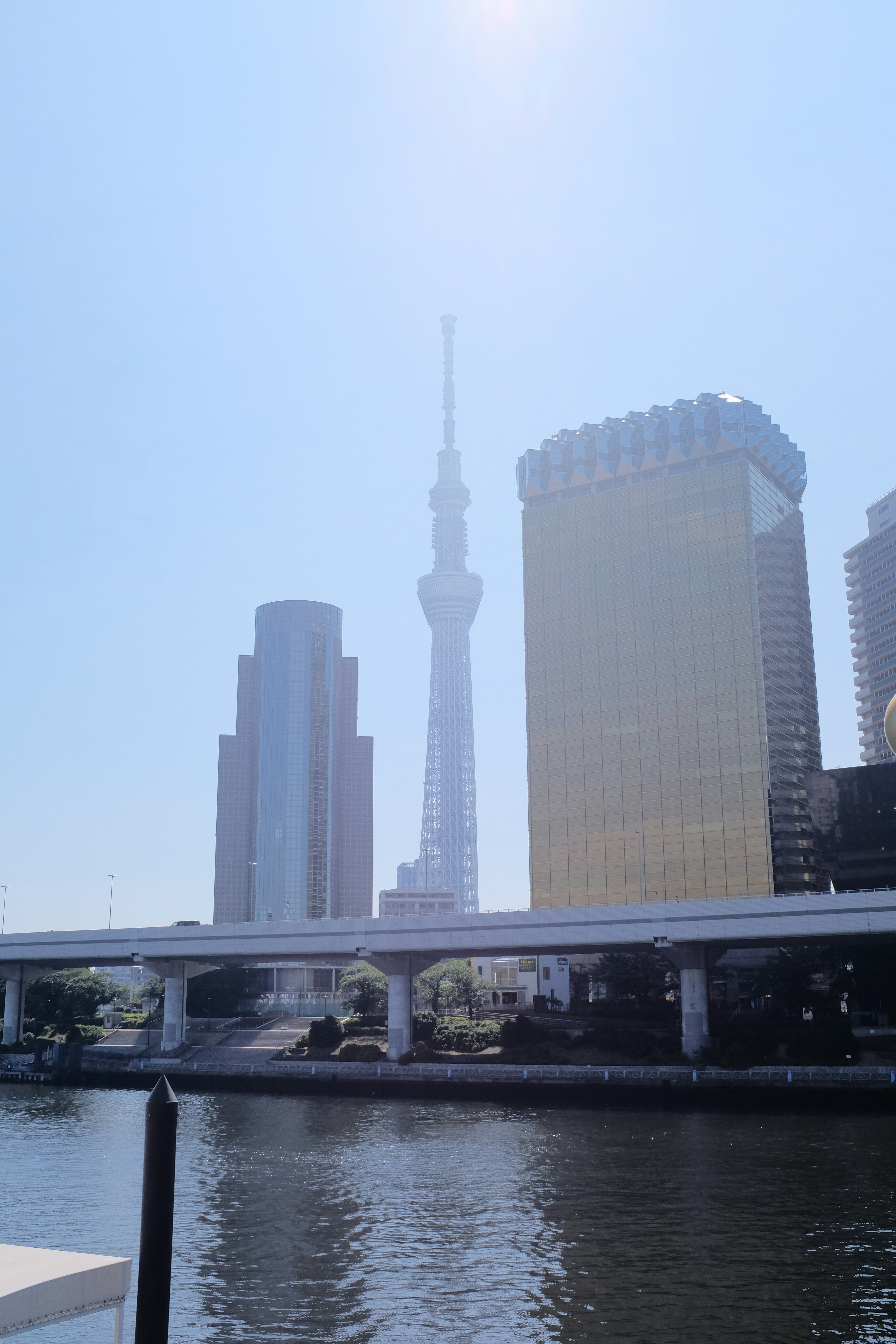 Skytree in the Haze: Quiet Morning Over Tokyo Riverside Skyline