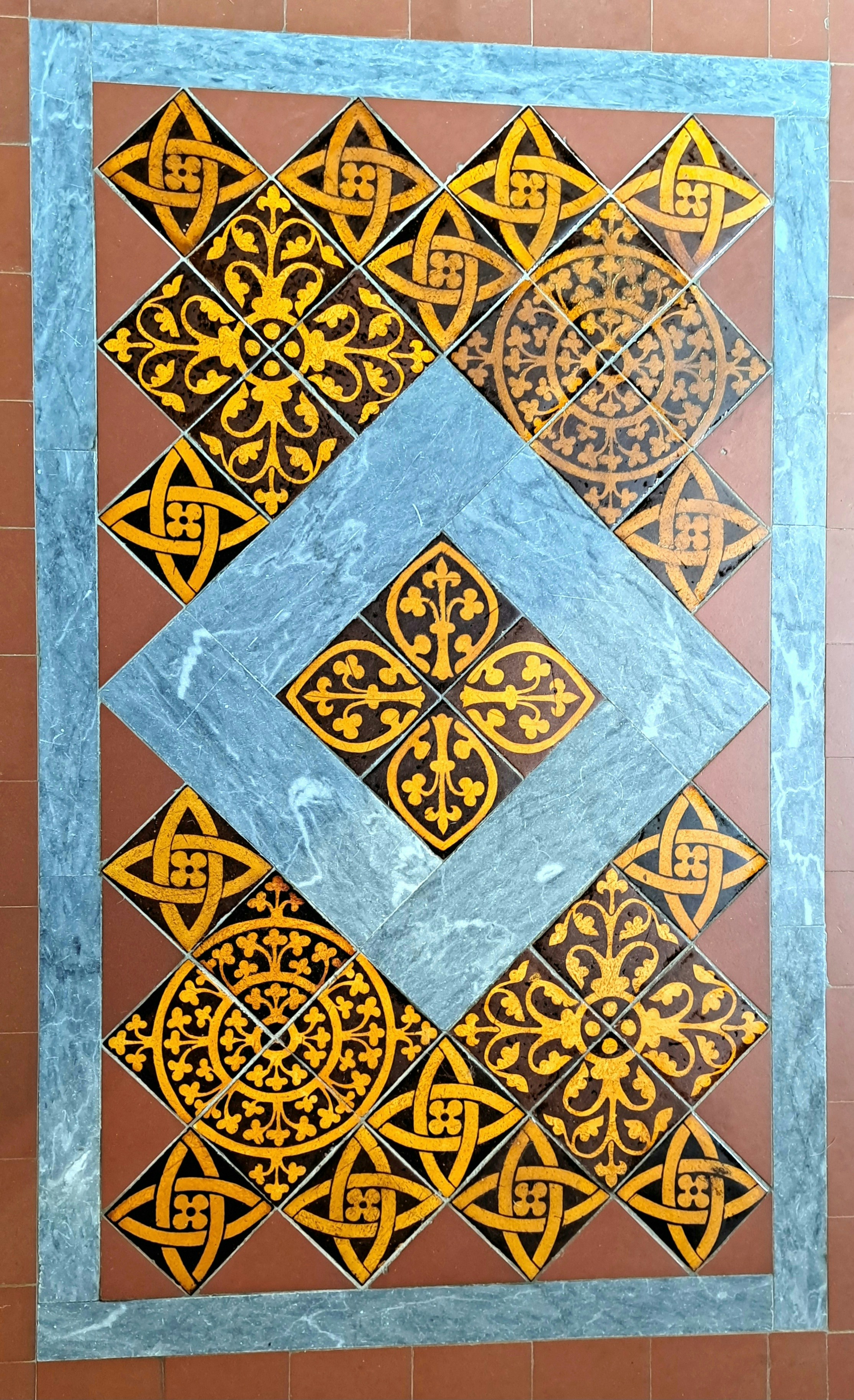 Geometric Tile Tapestry: Interlocking Patterns Framing a Marble Diamond