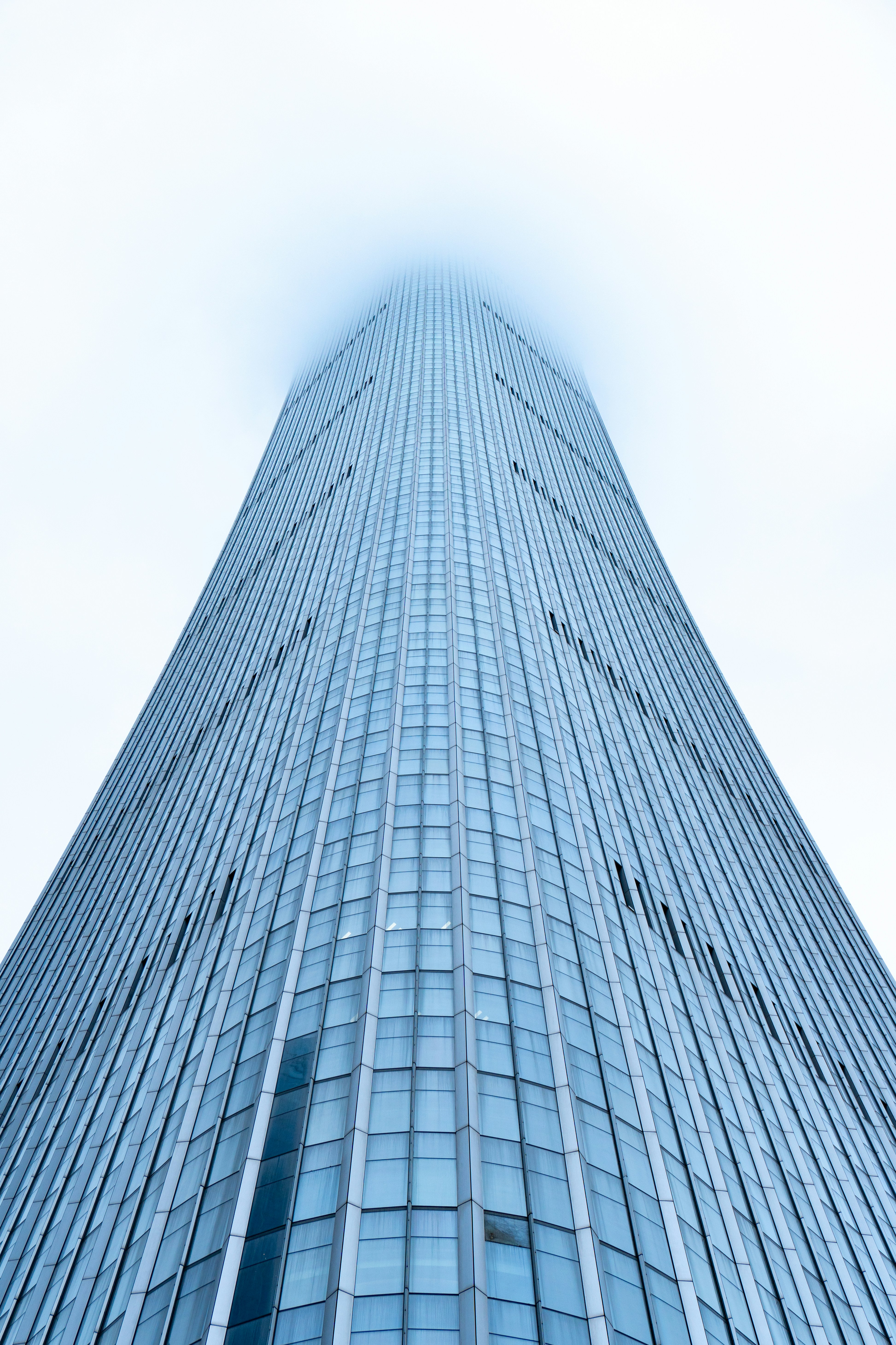 A very tall building with many windows on it photo – Free Beijing Image ...