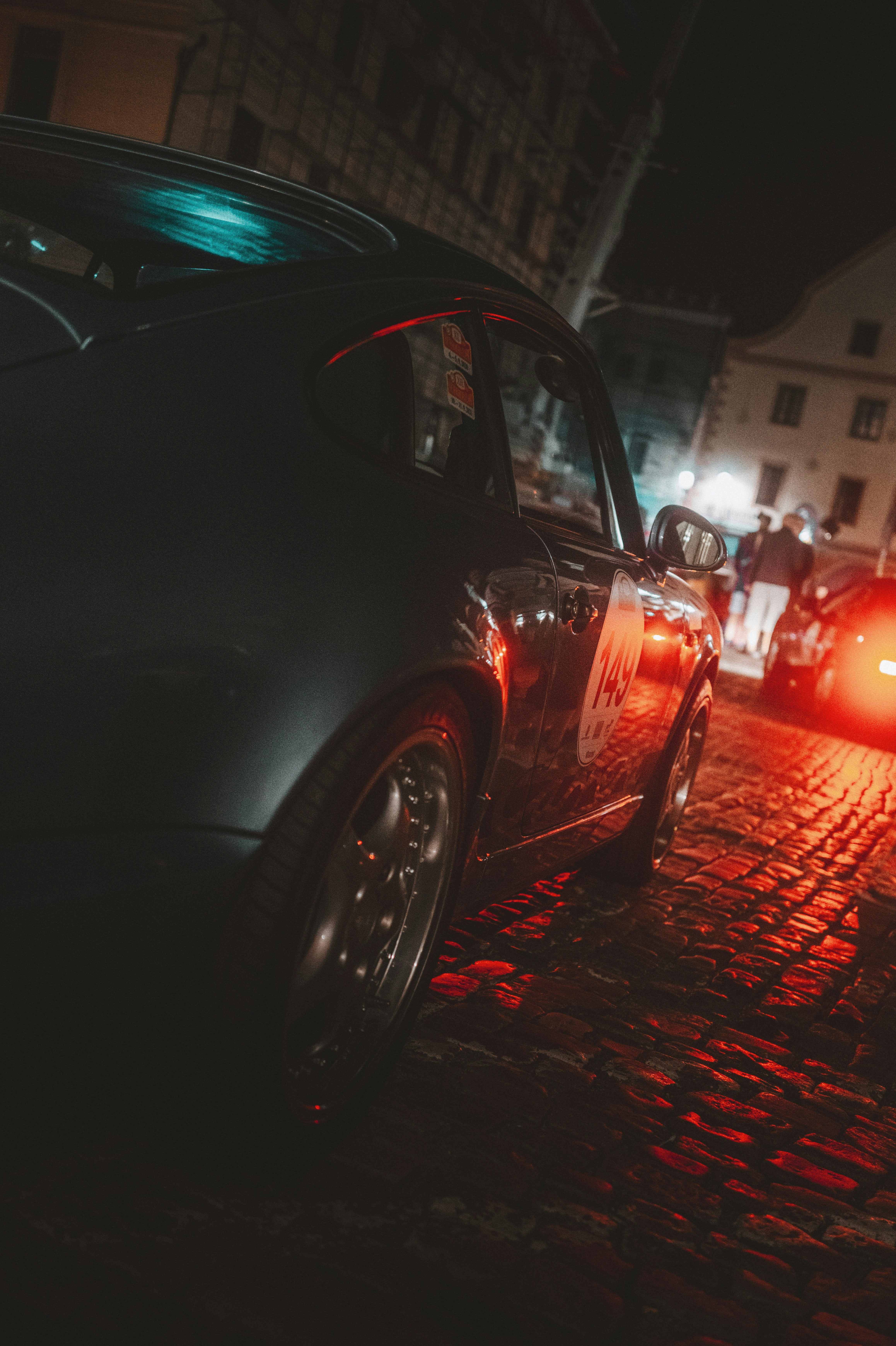 Night Ride: A Sidecar of Neon Reflections on Cobblestones