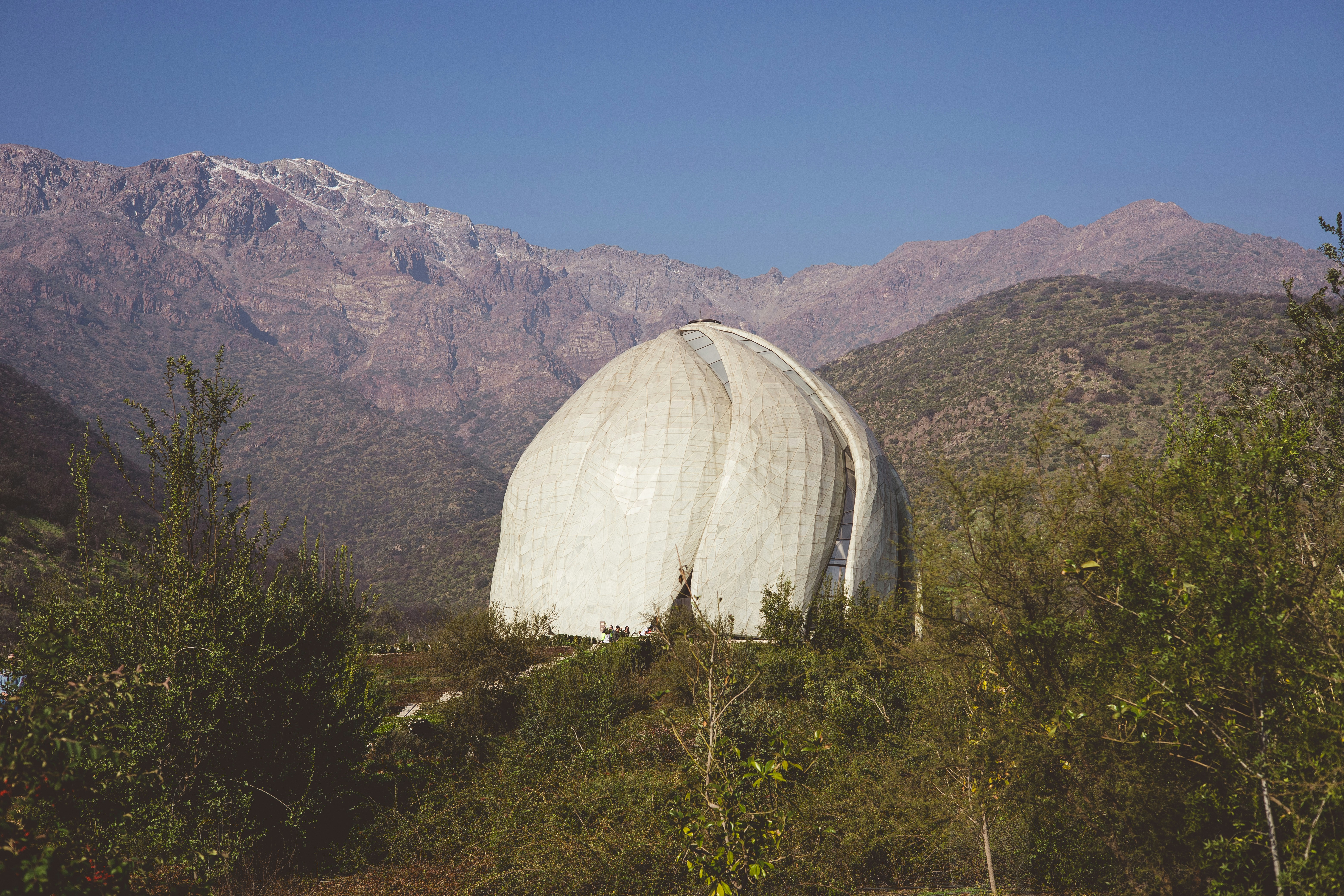 Desert Observatory Dome Nestled Between Arid Peaks