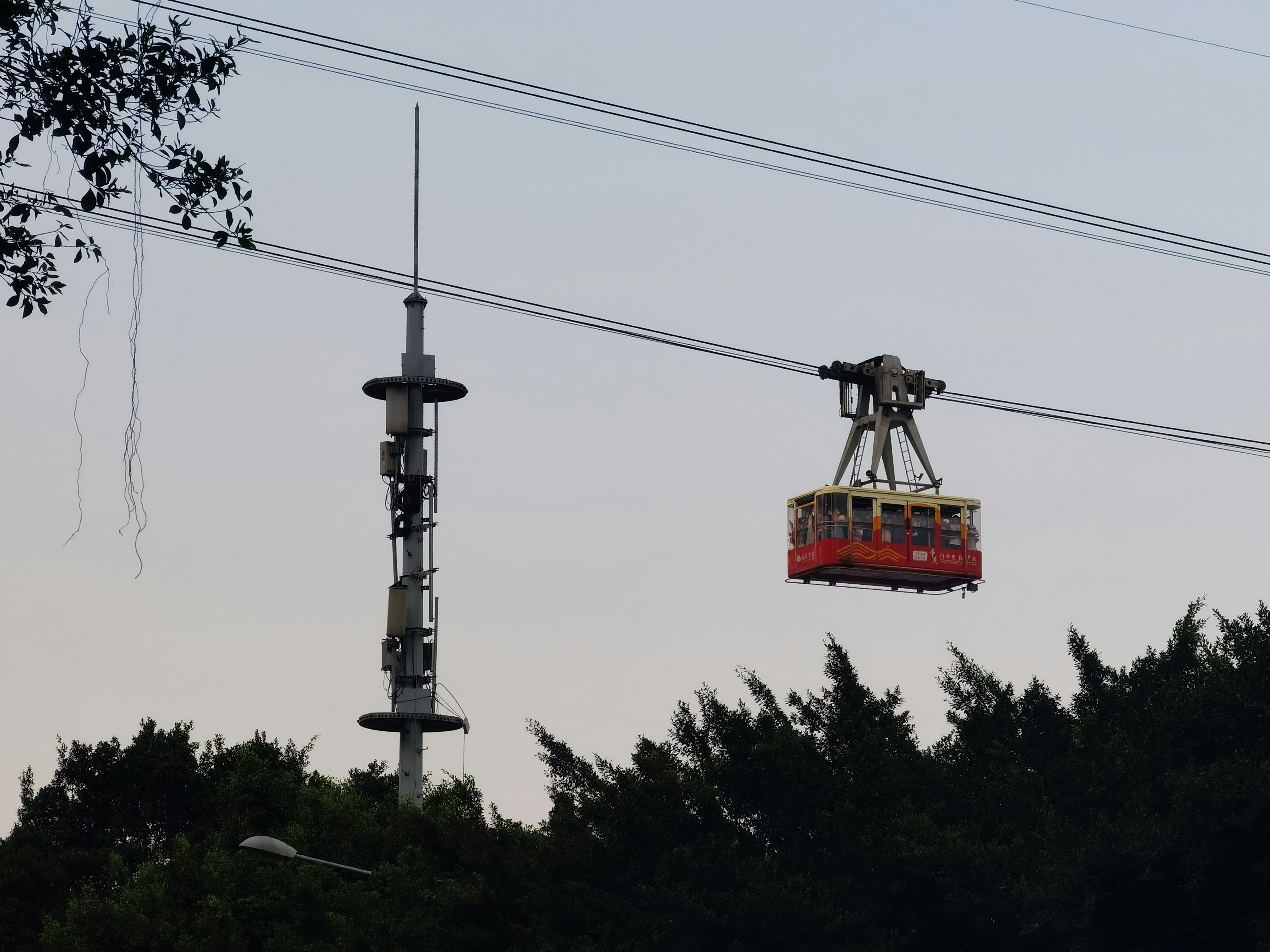 A cable car going up a hill in the sky photo – Free Nature Image on ...